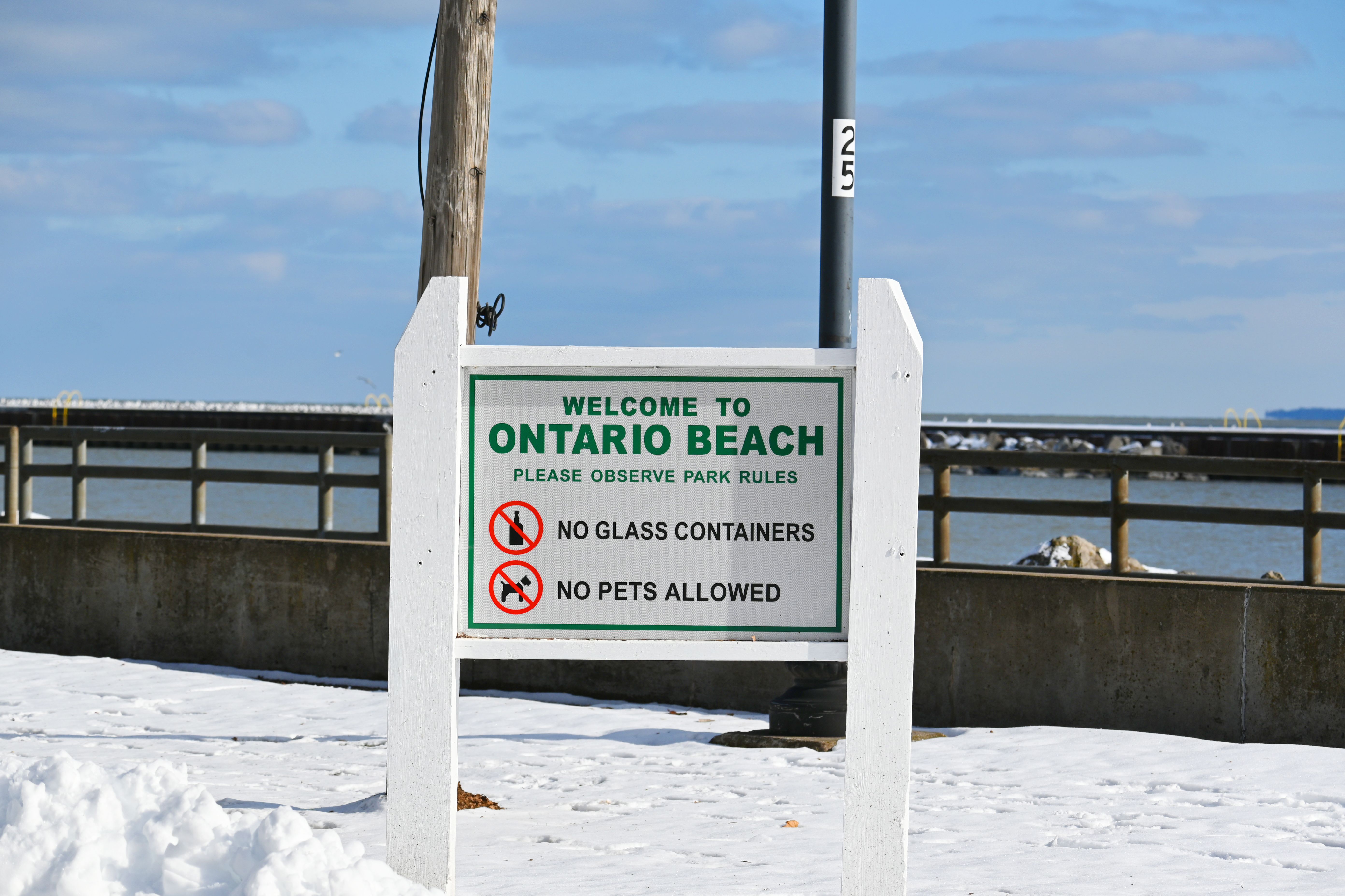 Ontario Beach Sign in Snow-Laden Winter Scene · Free Stock Photo