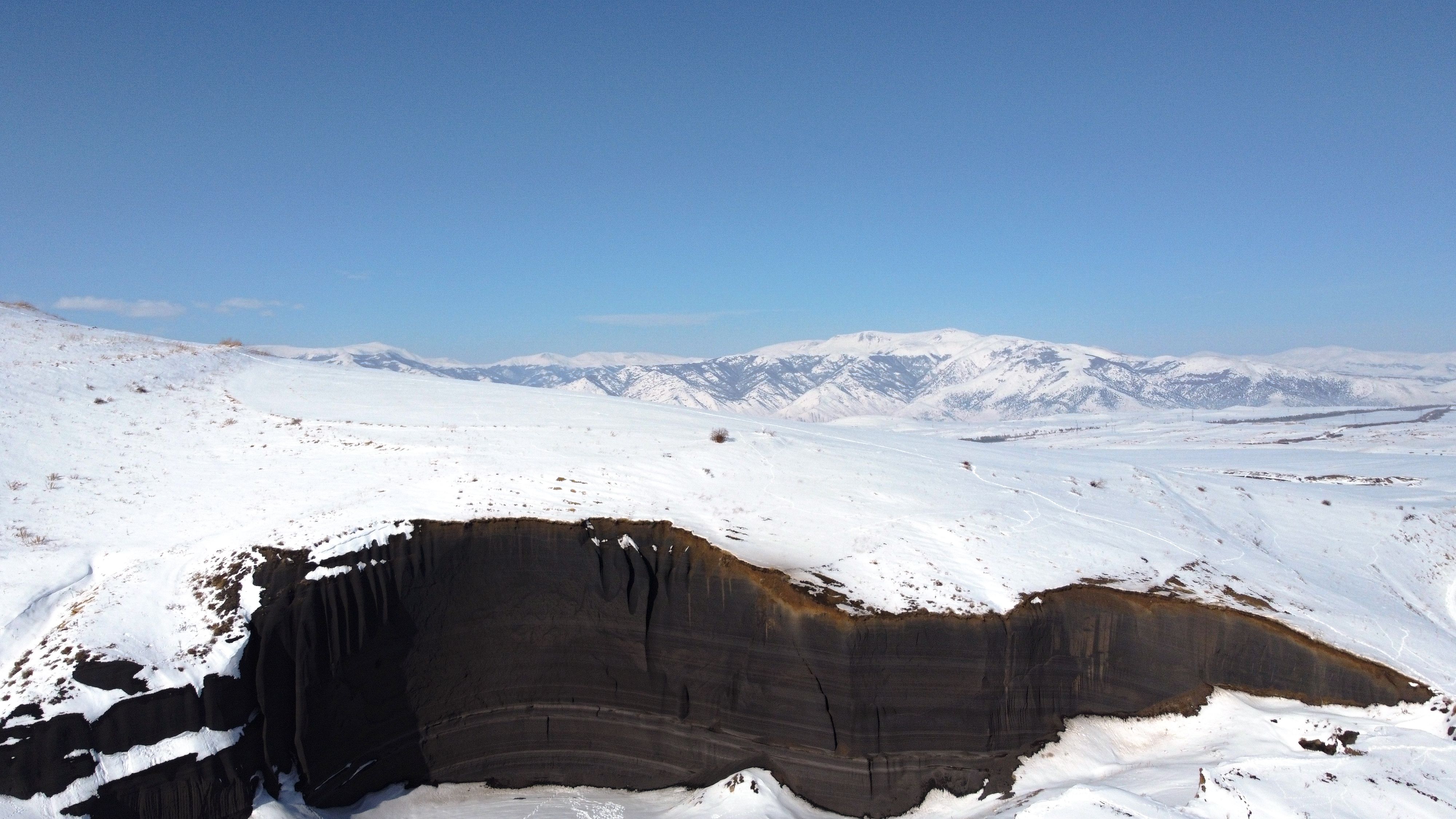 Snowy Cliffside View in Kotayk Province, Armenia · Free Stock Photo