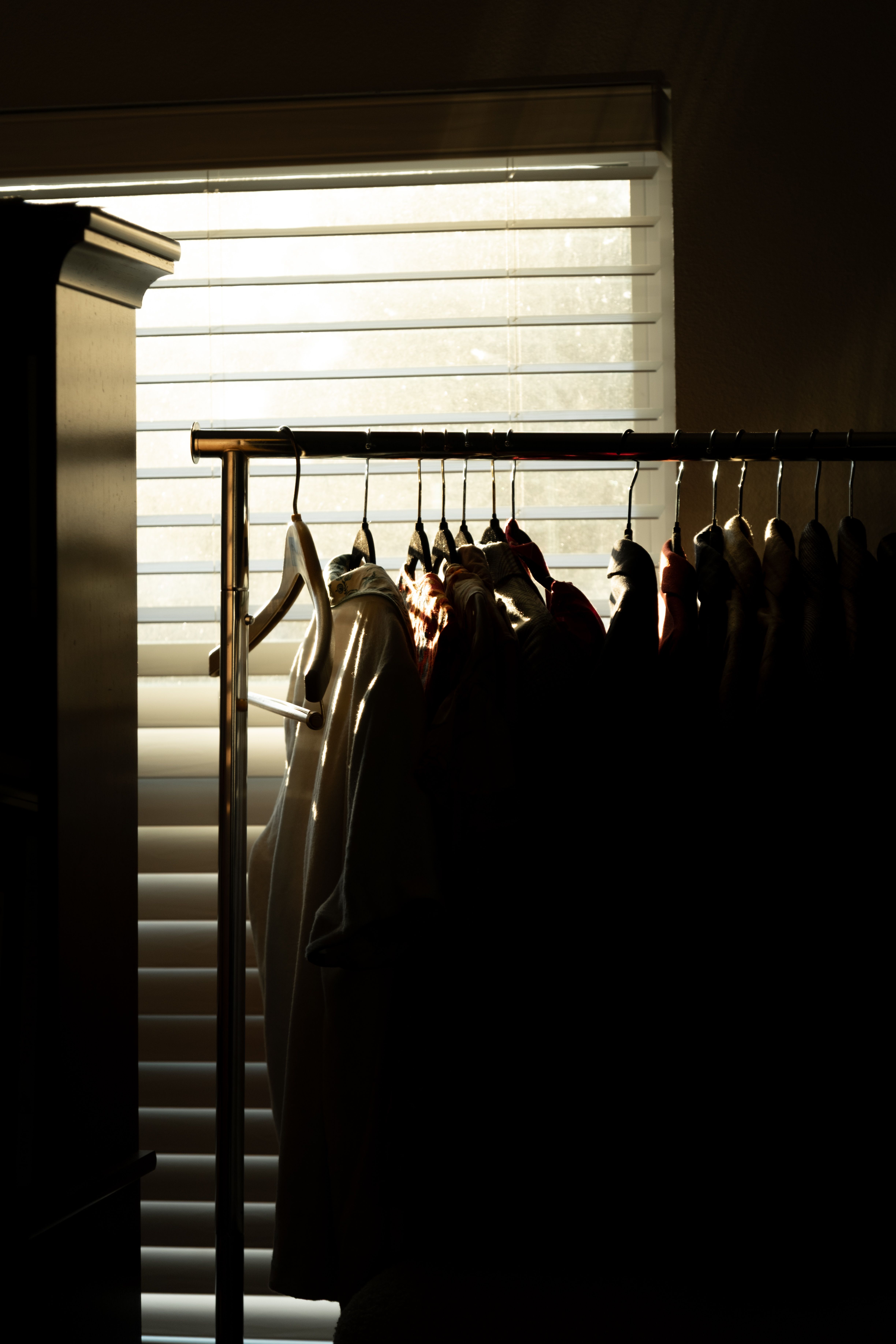 Minimalist Clothing Rack Shadow Play in Sarasota · Free Stock Photo