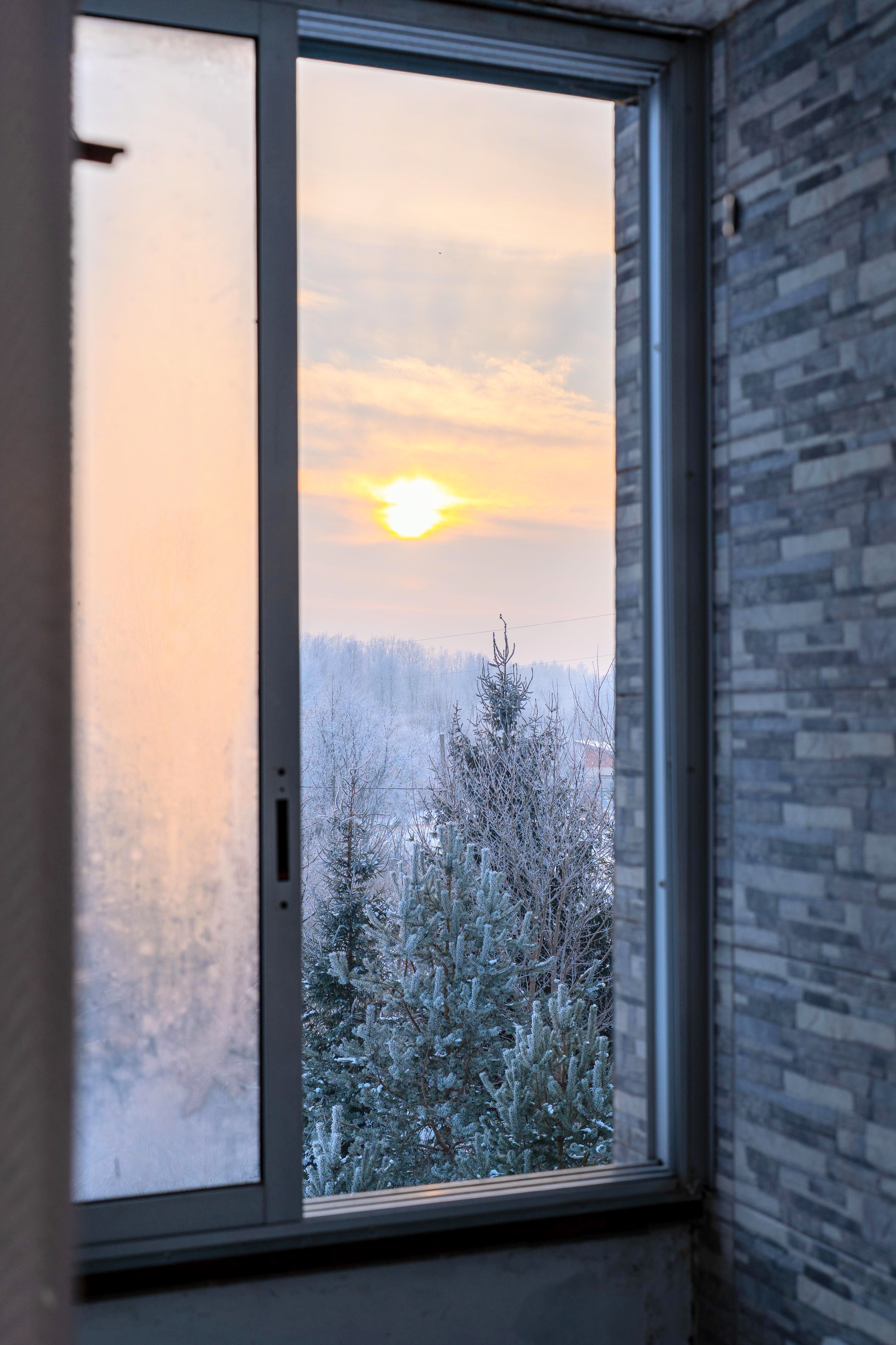 Winter Sunrise View from Indoor Window · Free Stock Photo