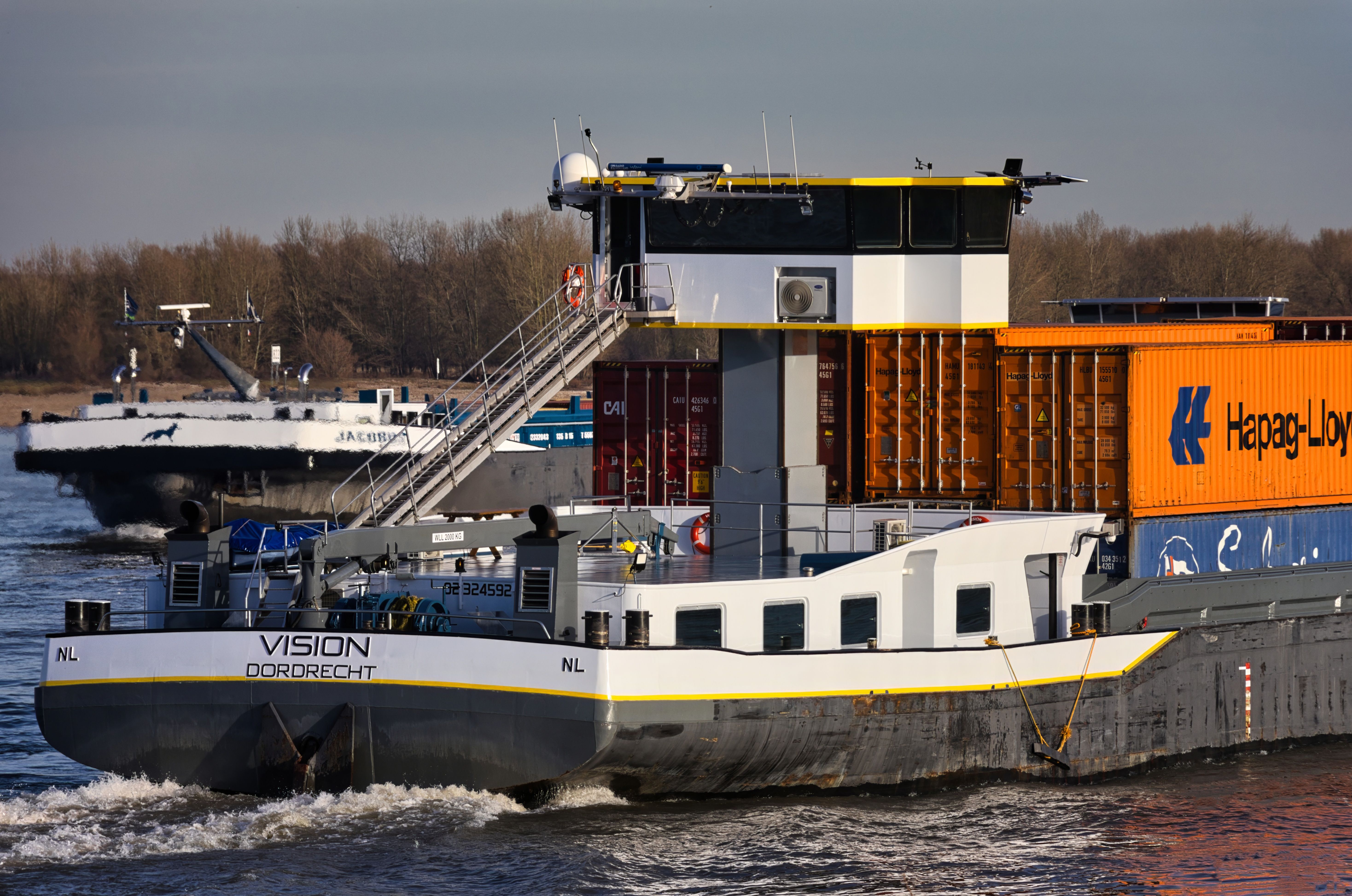 Cargo Ship on River with Containers · Free Stock Photo