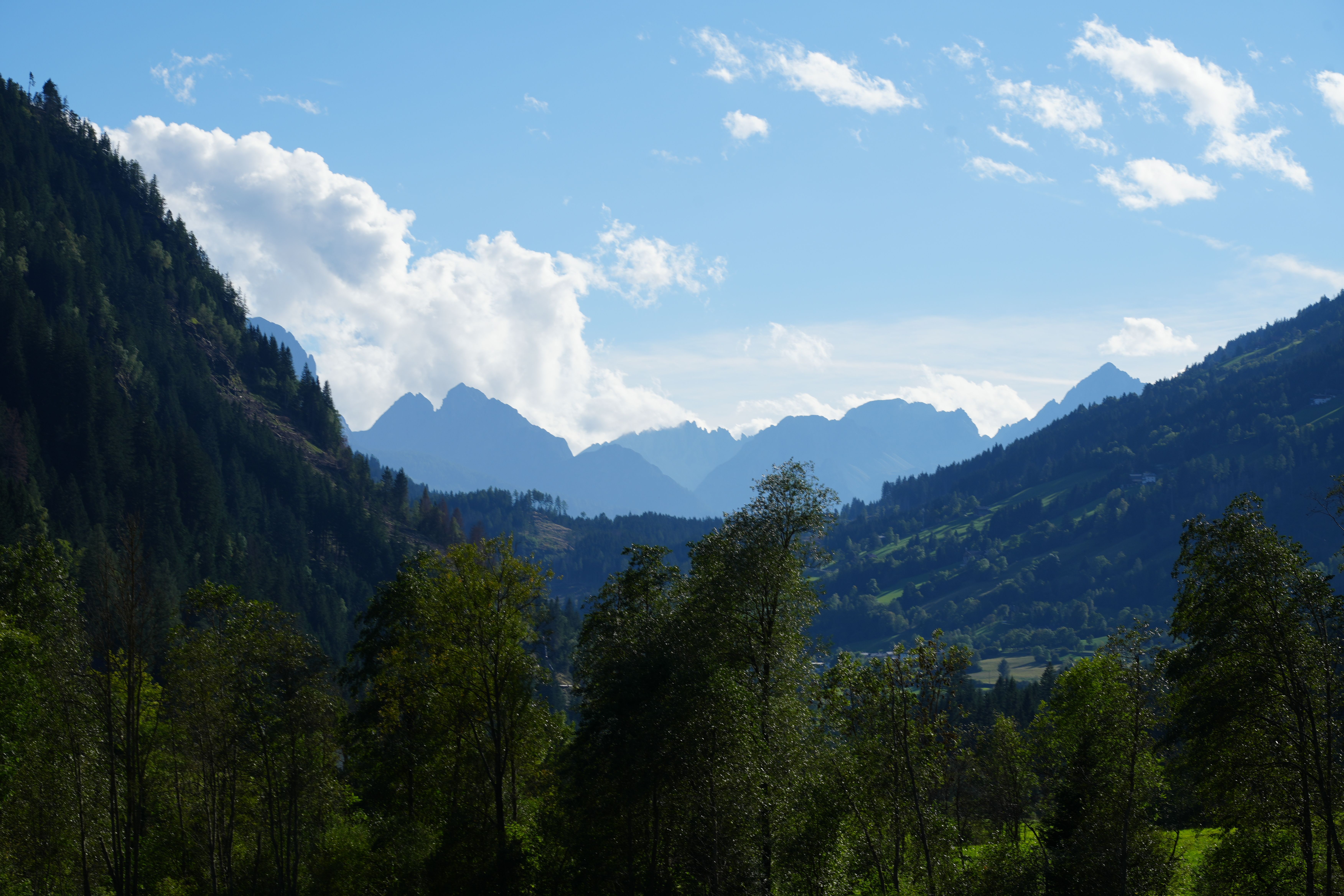 Scenic Alpine Mountain Range Under Blue Sky · Free Stock Photo