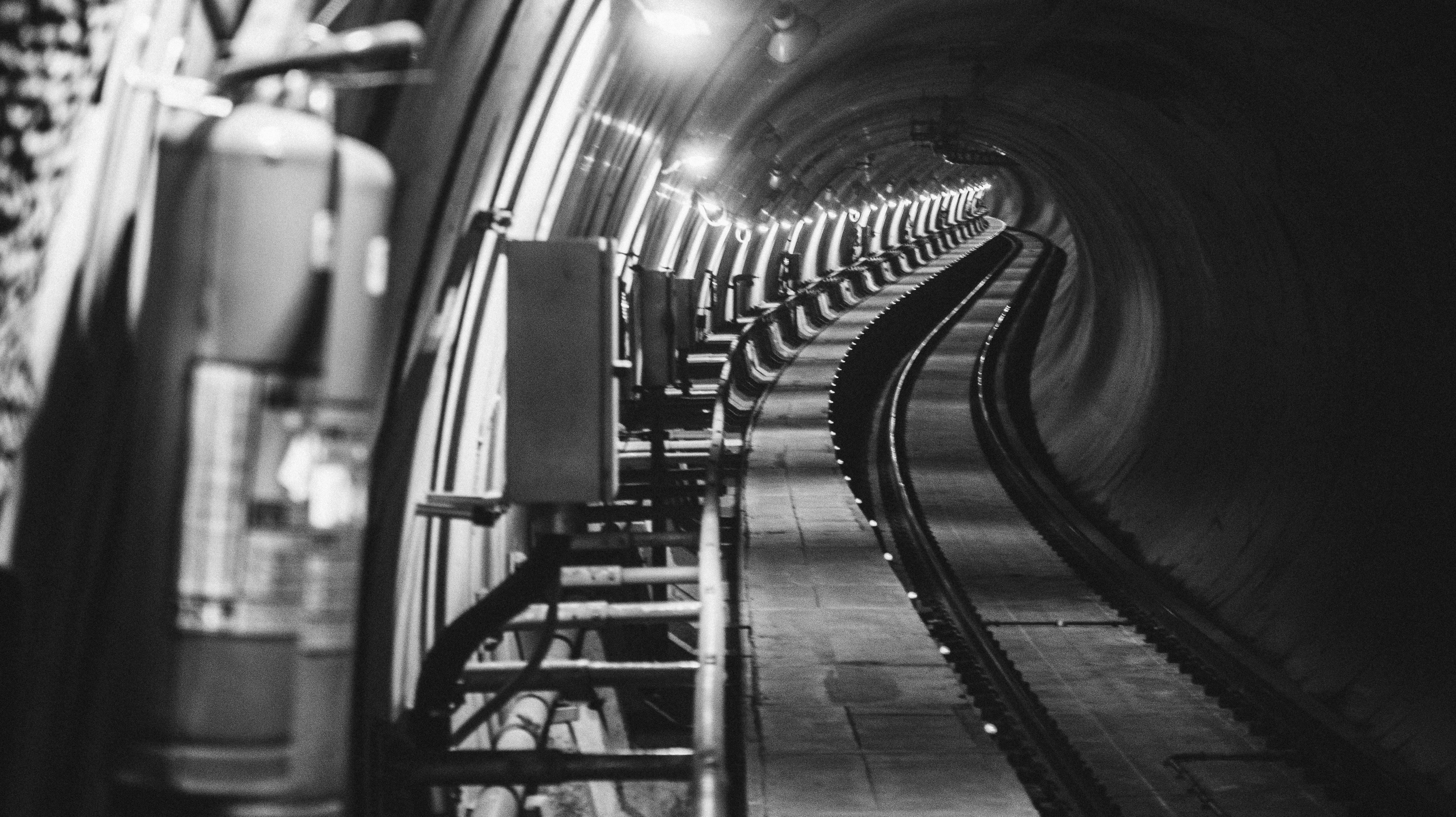 Empty subway station with dirty columns and railroad · Free Stock Photo
