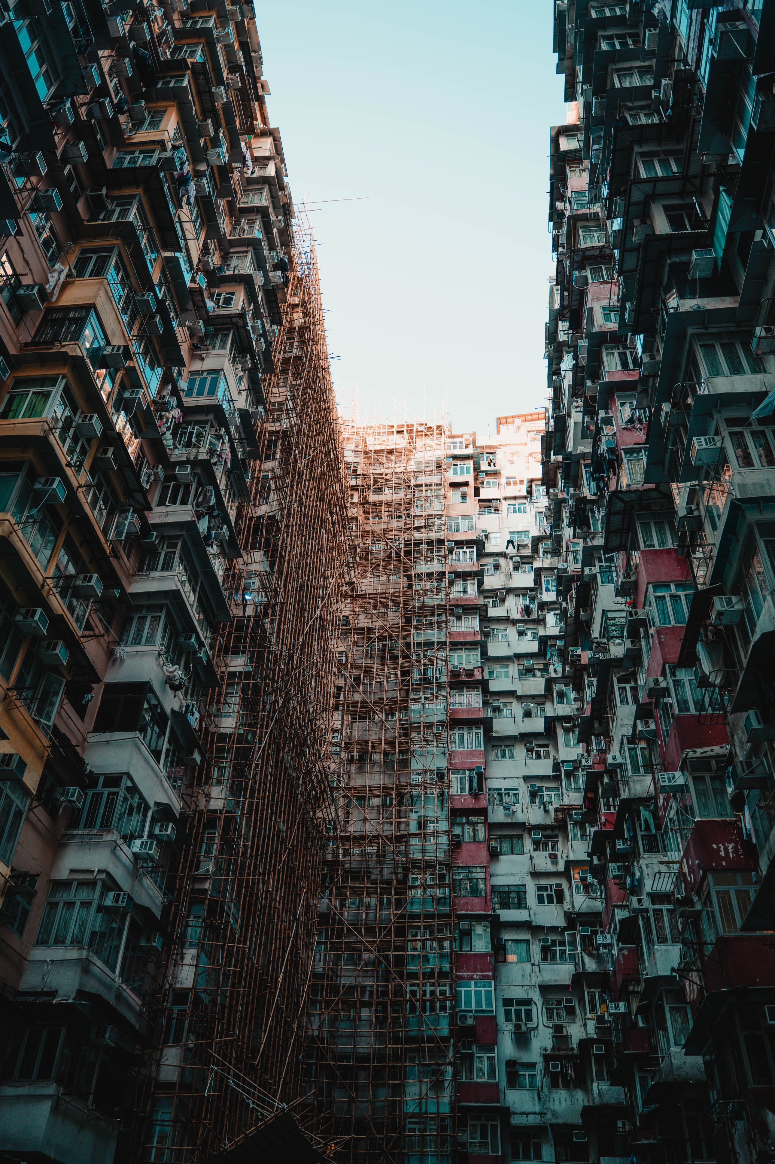 Dense Urban Architecture with Bamboo Scaffolding · Free Stock Photo
