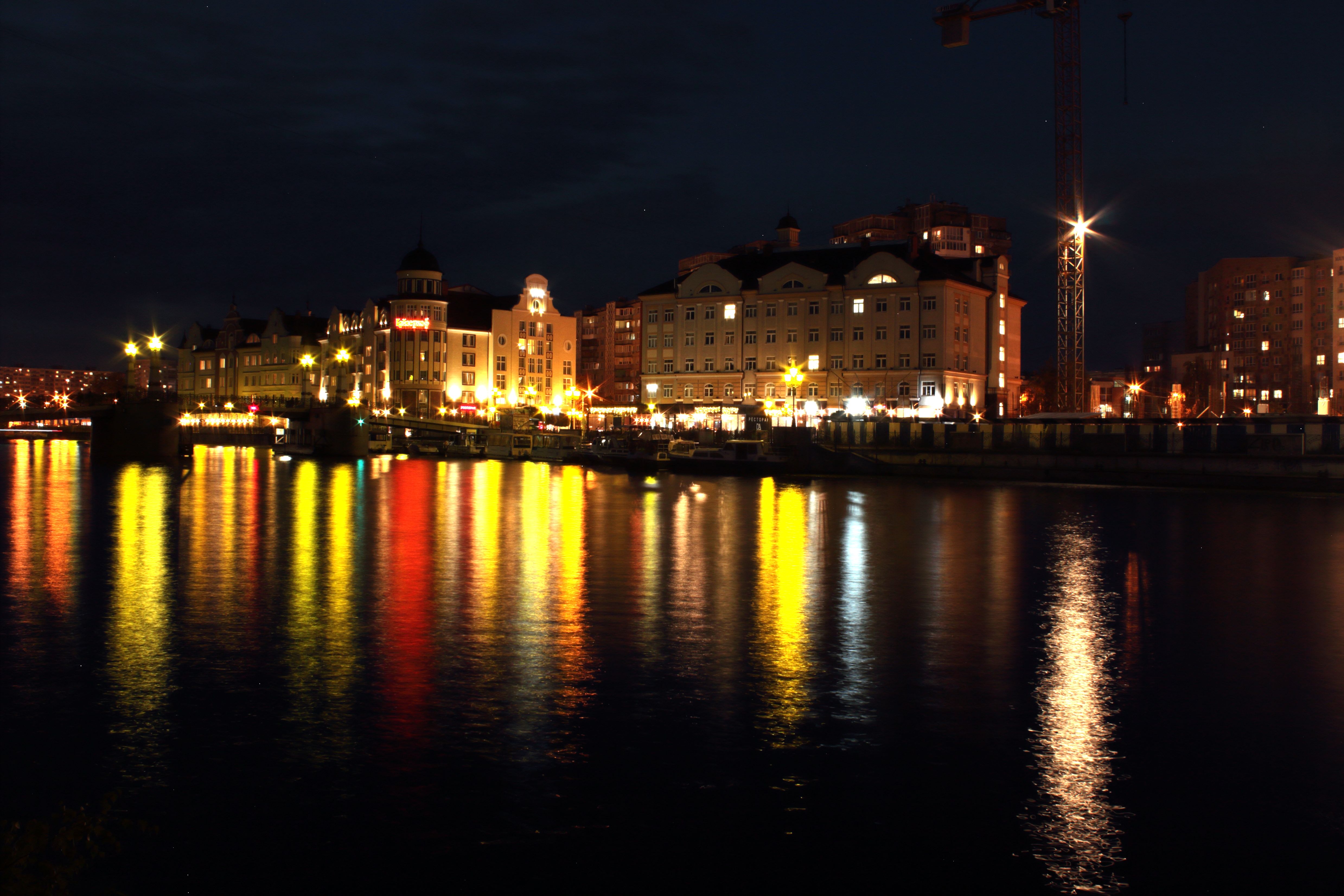Nighttime Cityscape of Kaliningrad's Waterfront · Free Stock Photo