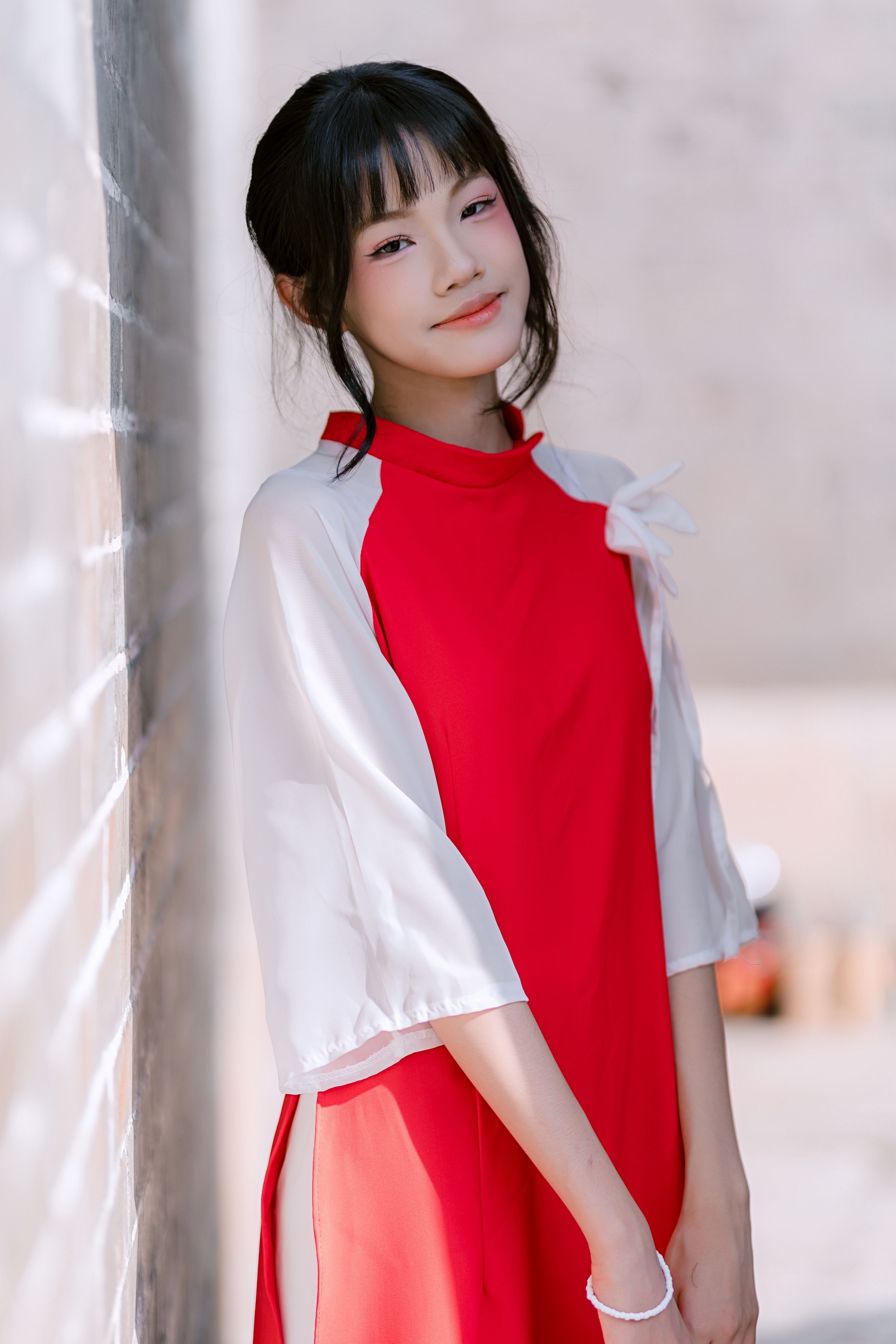 Charming Young Woman in Red Dress Portrait · Free Stock Photo