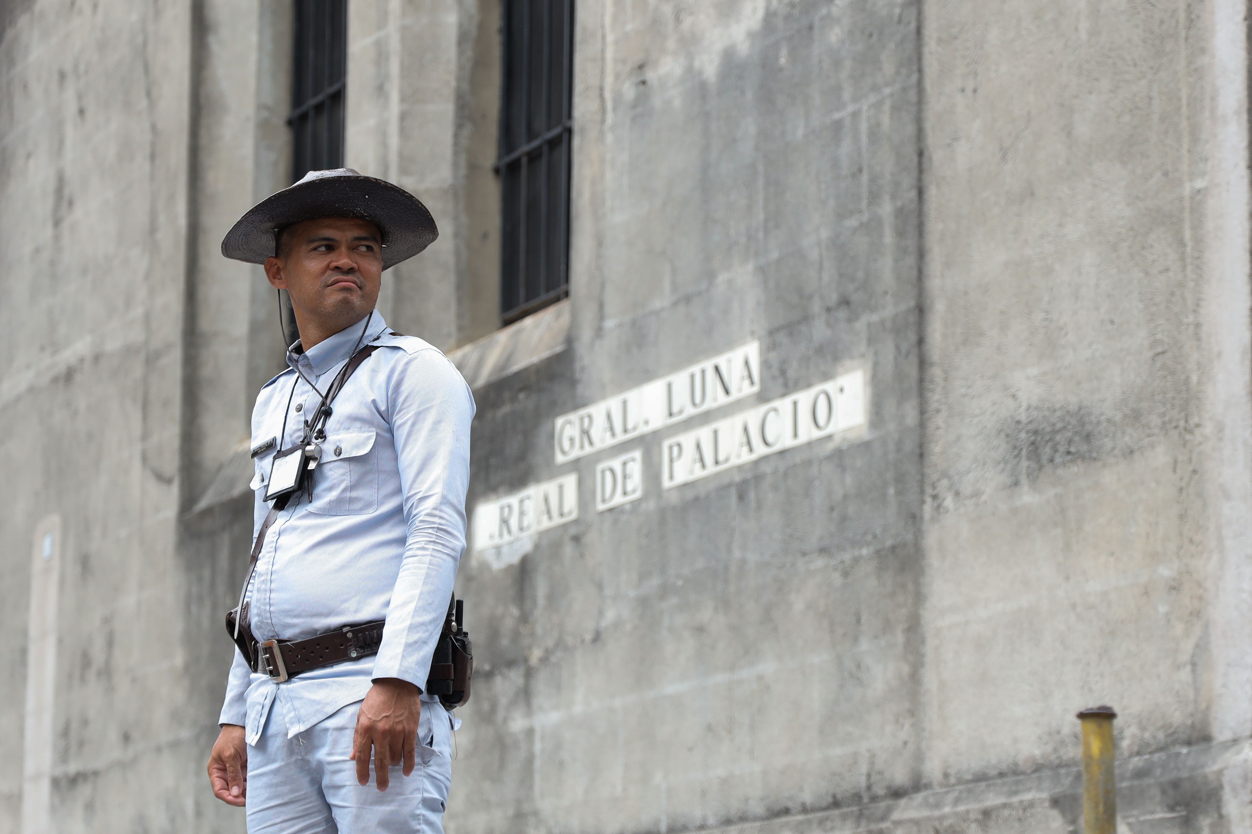 Guard in Traditional Attire at Historic Manila · Free Stock Photo