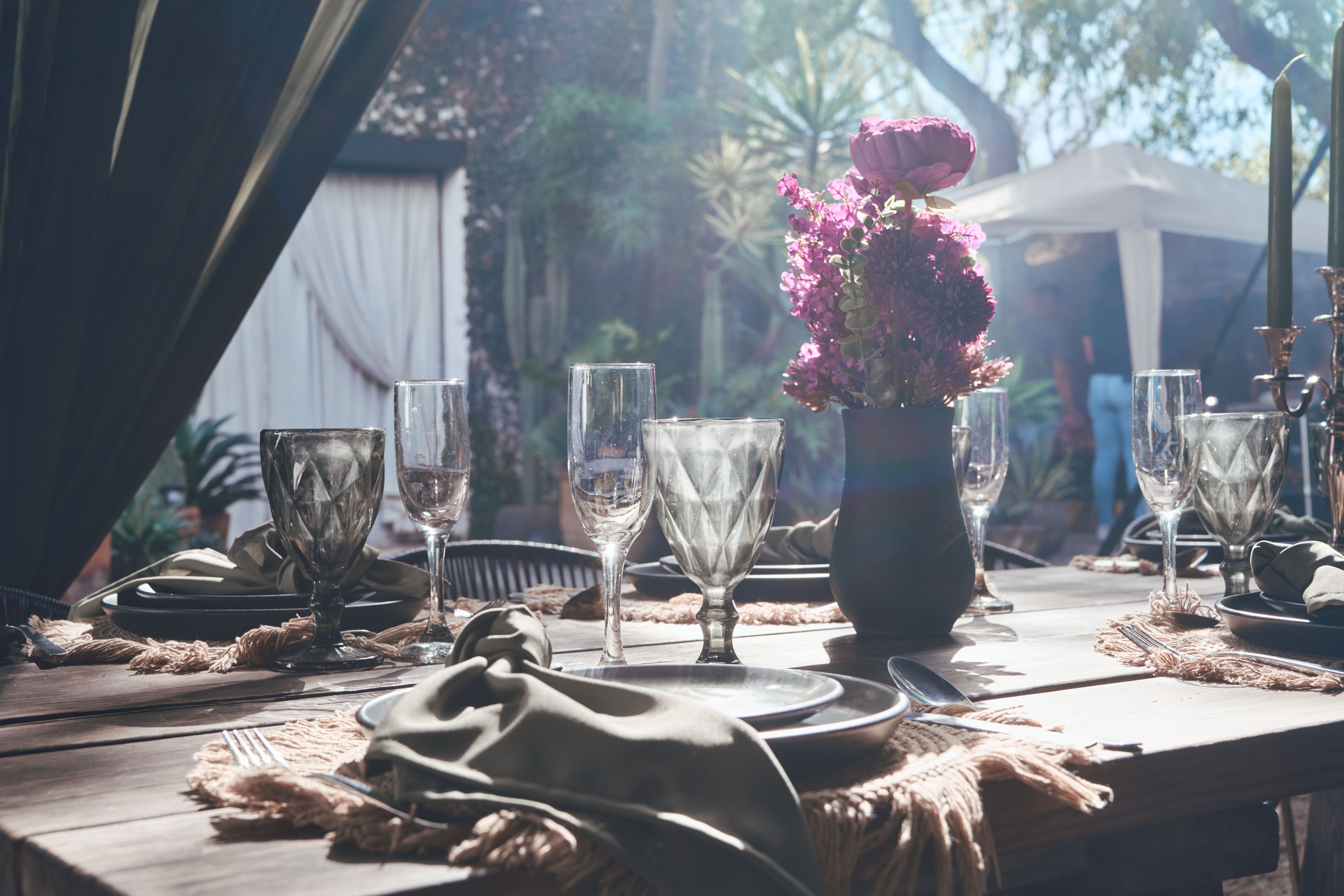 Elegant Outdoor Dining Setup with Floral Centerpiece · Free Stock Photo