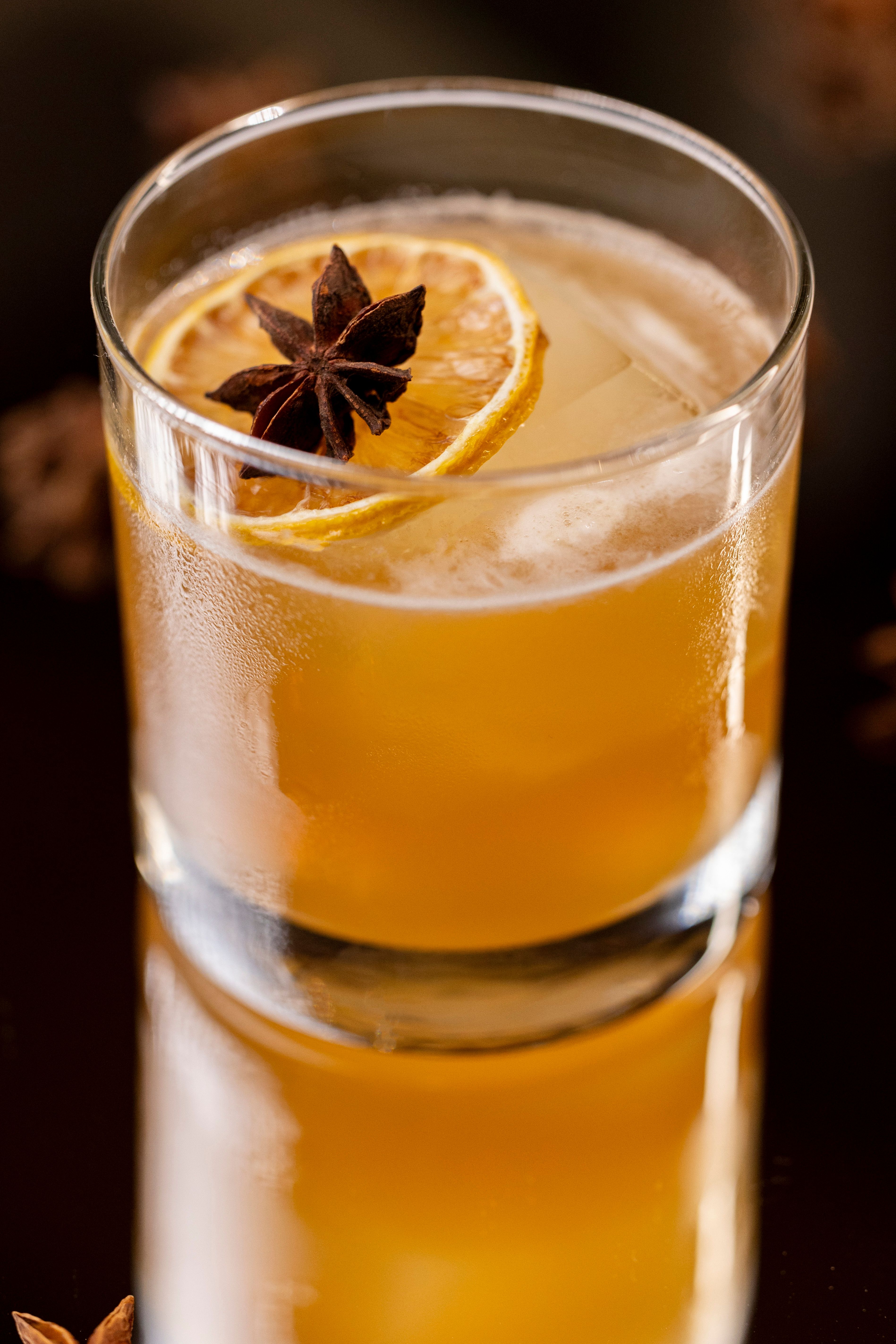 Refreshing Citrus Cocktail with Star Anise Garnish · Free Stock Photo