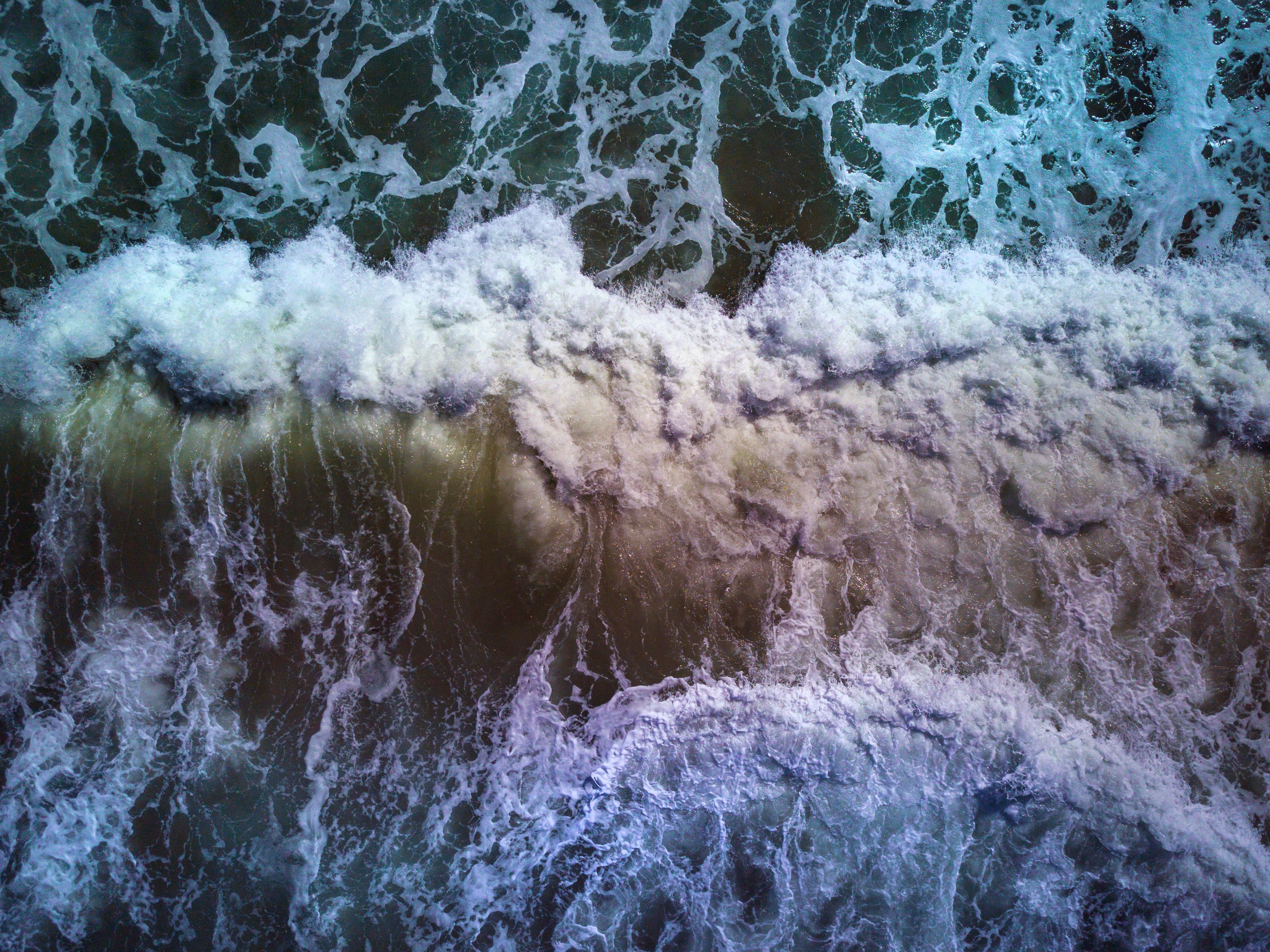 Aerial Photography of Flow of Water Near Sand · Free Stock Photo