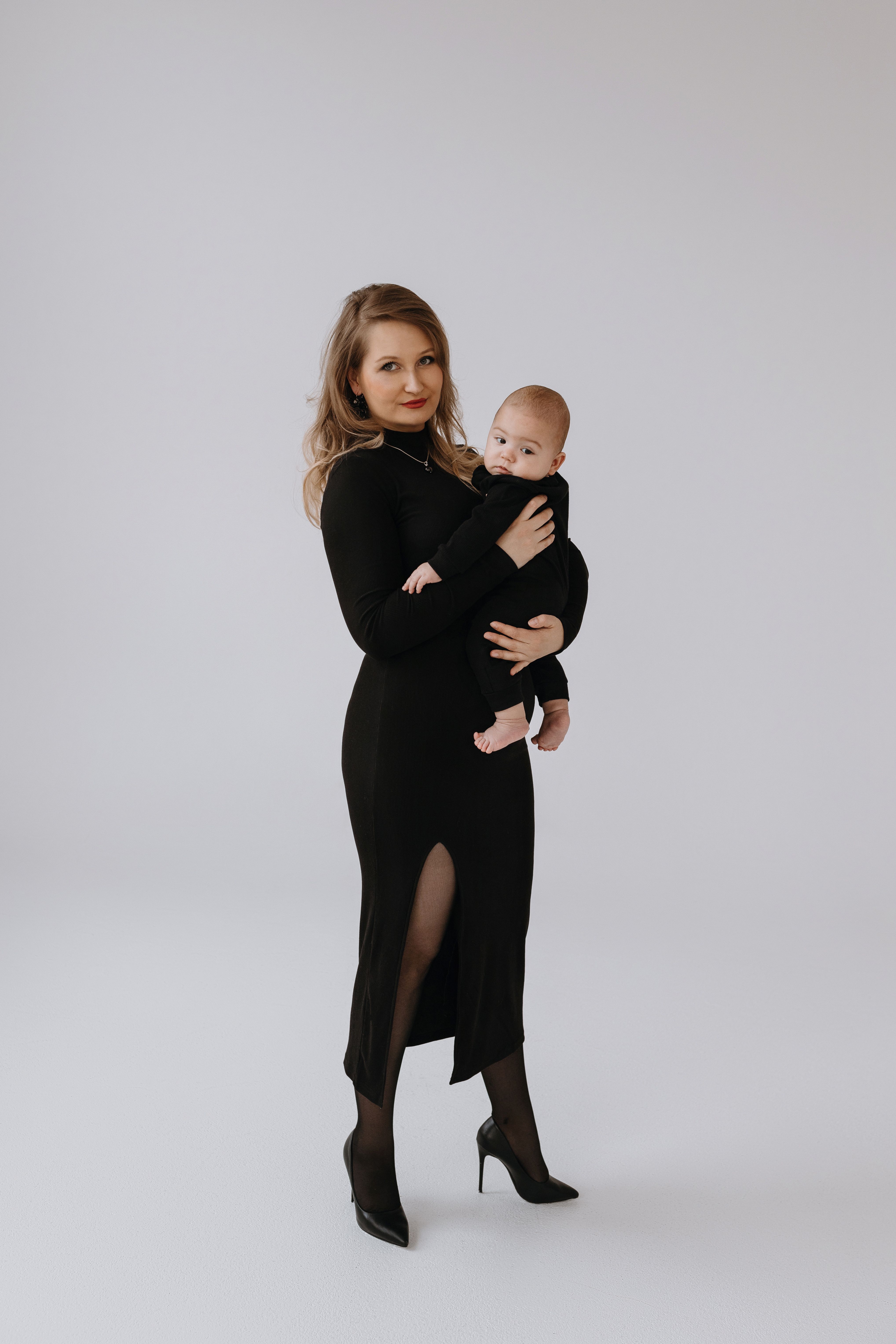 Elegant Mother and Baby Studio Portrait · Free Stock Photo
