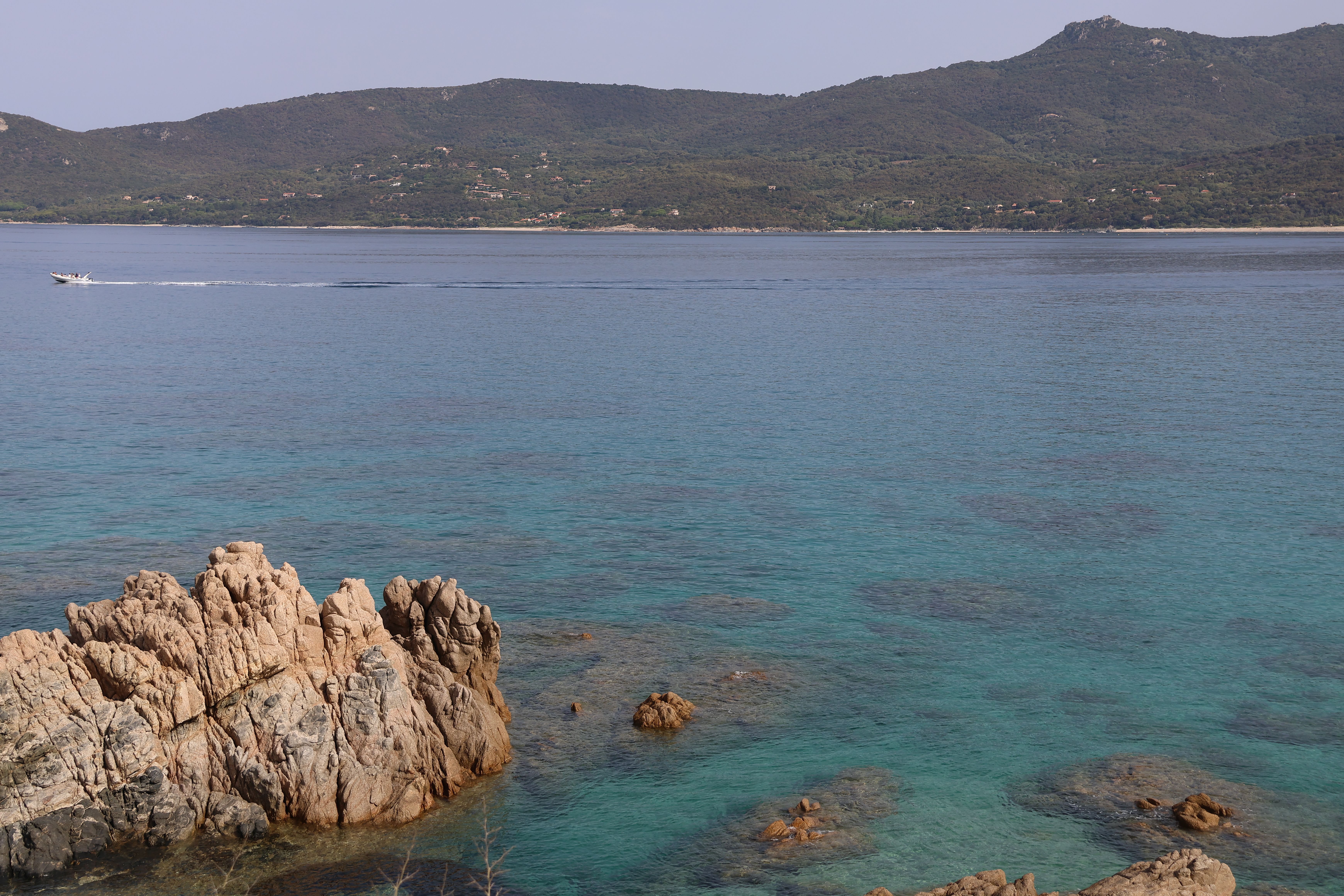 Scenic Coastal Landscape with Rocky Shoreline · Free Stock Photo