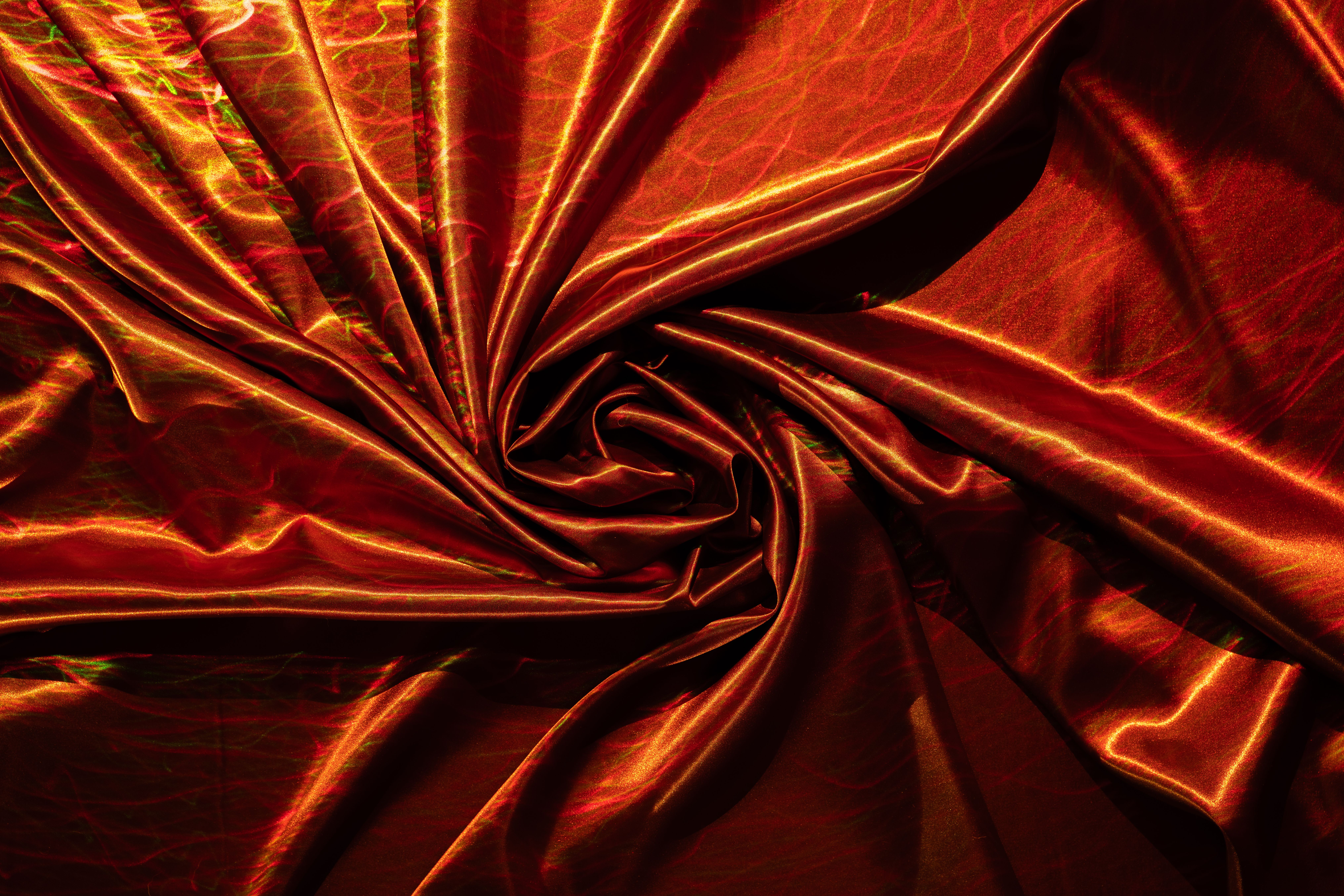 Elegant Red Satin Fabric with Luxurious Folds · Free Stock Photo