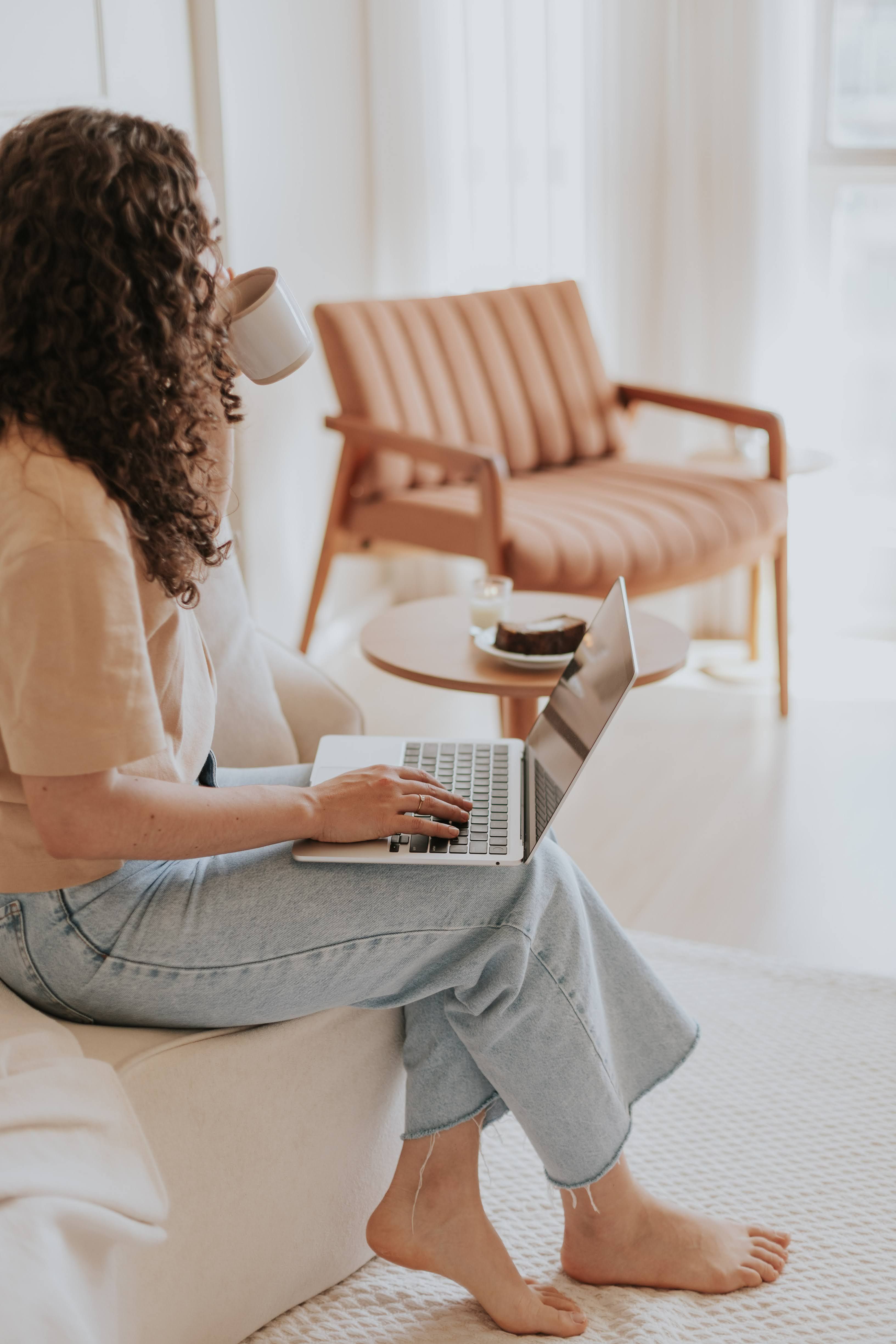 Woman Reading Book in Cozy Minimalist Room · Free Stock Photo