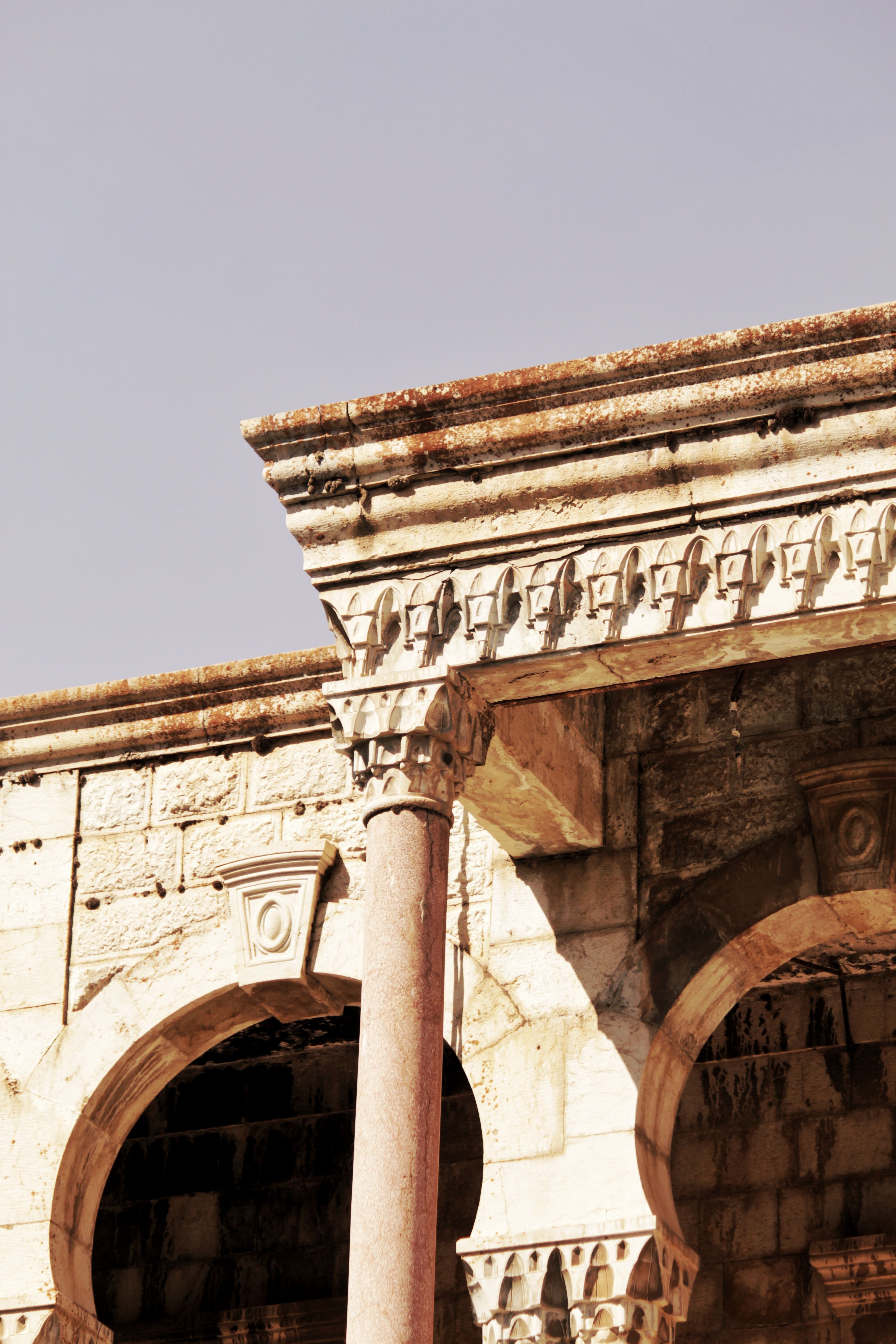Close-up of Ancient Roman Architecture Details · Free Stock Photo