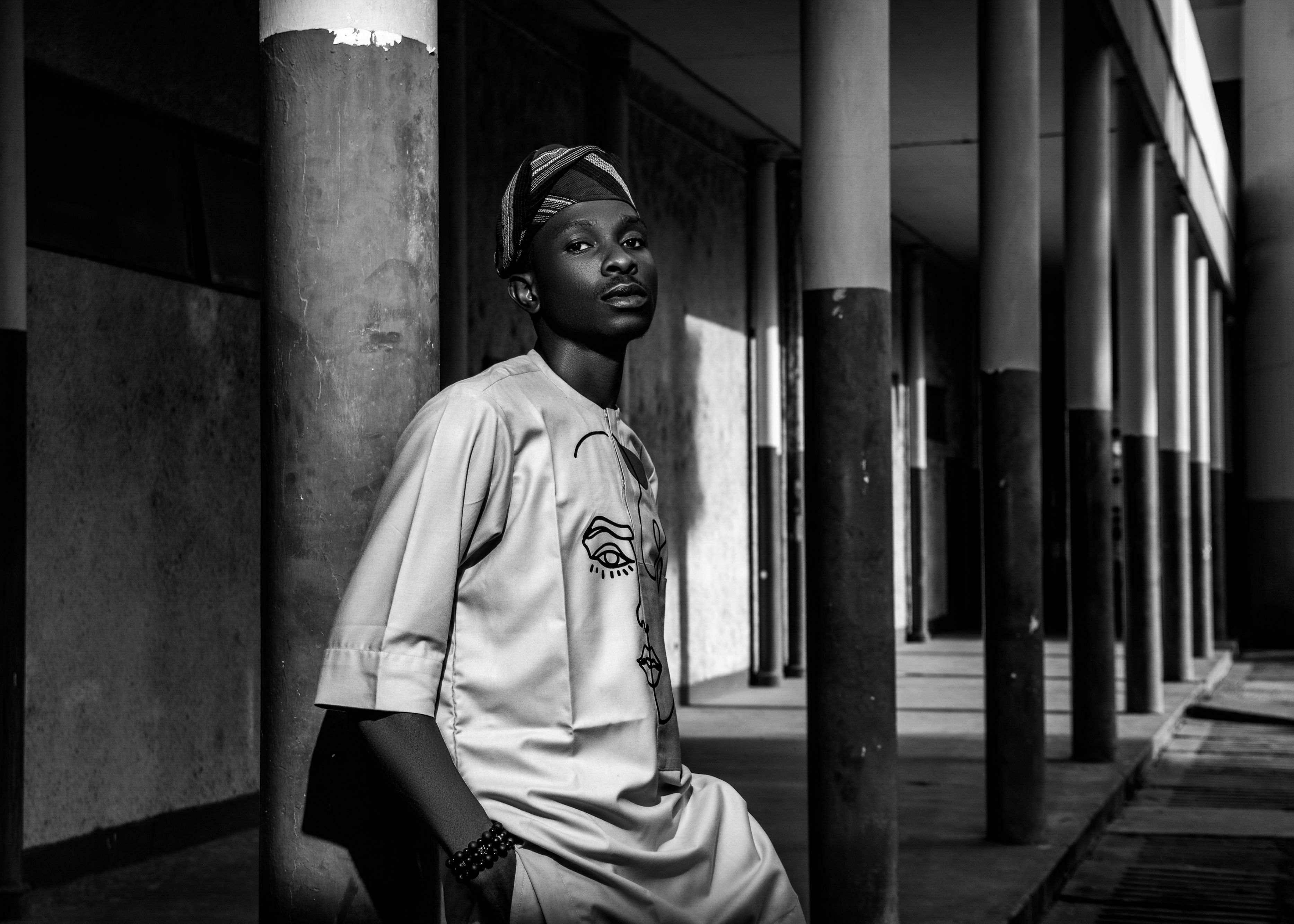 Black and White Portrait of a Man in Traditional Attire · Free Stock Photo