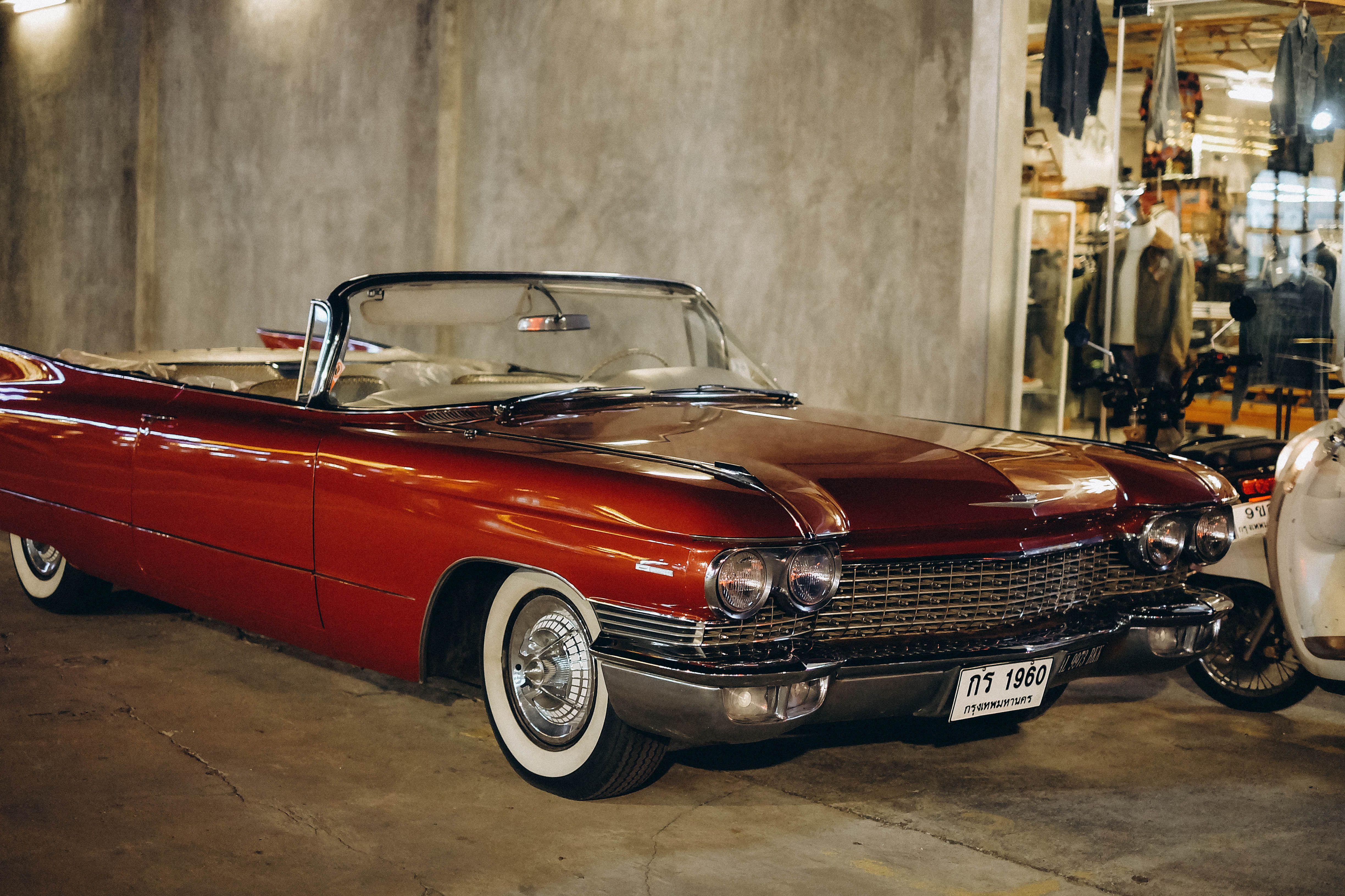 Vintage Red Convertible Car in Bangkok Garage · Free Stock Photo