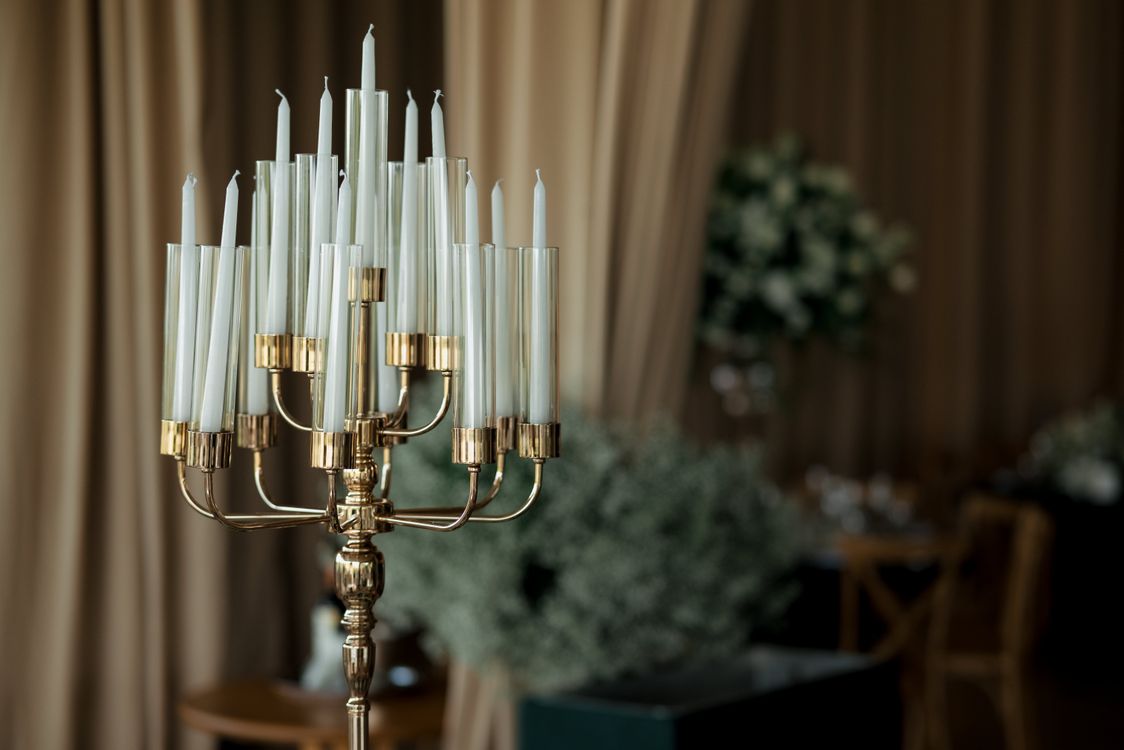 Elegant Golden Candelabra with Lit White Candles · Free Stock Photo