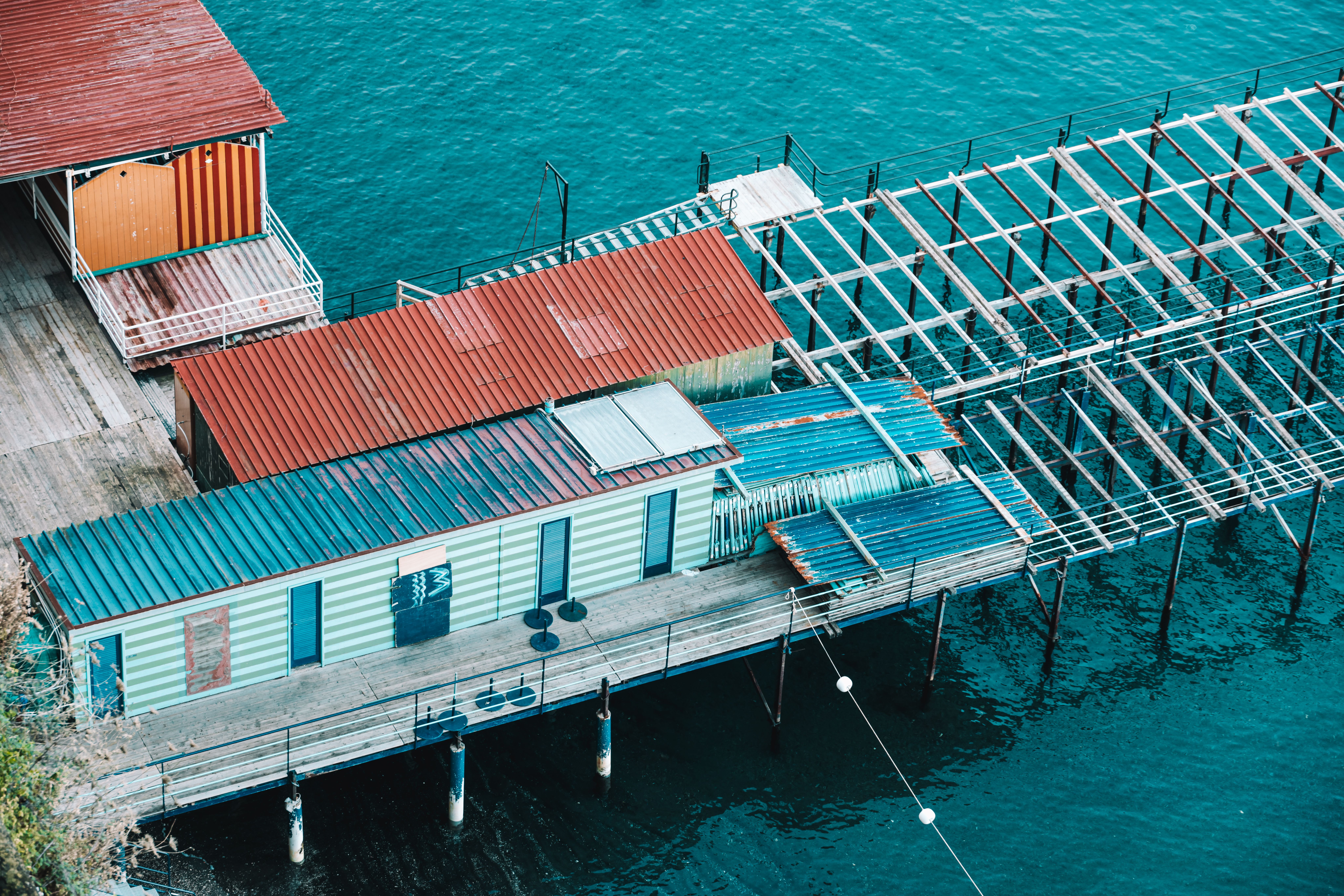 Aerial View of Colorful Lakeside Docks · Free Stock Photo