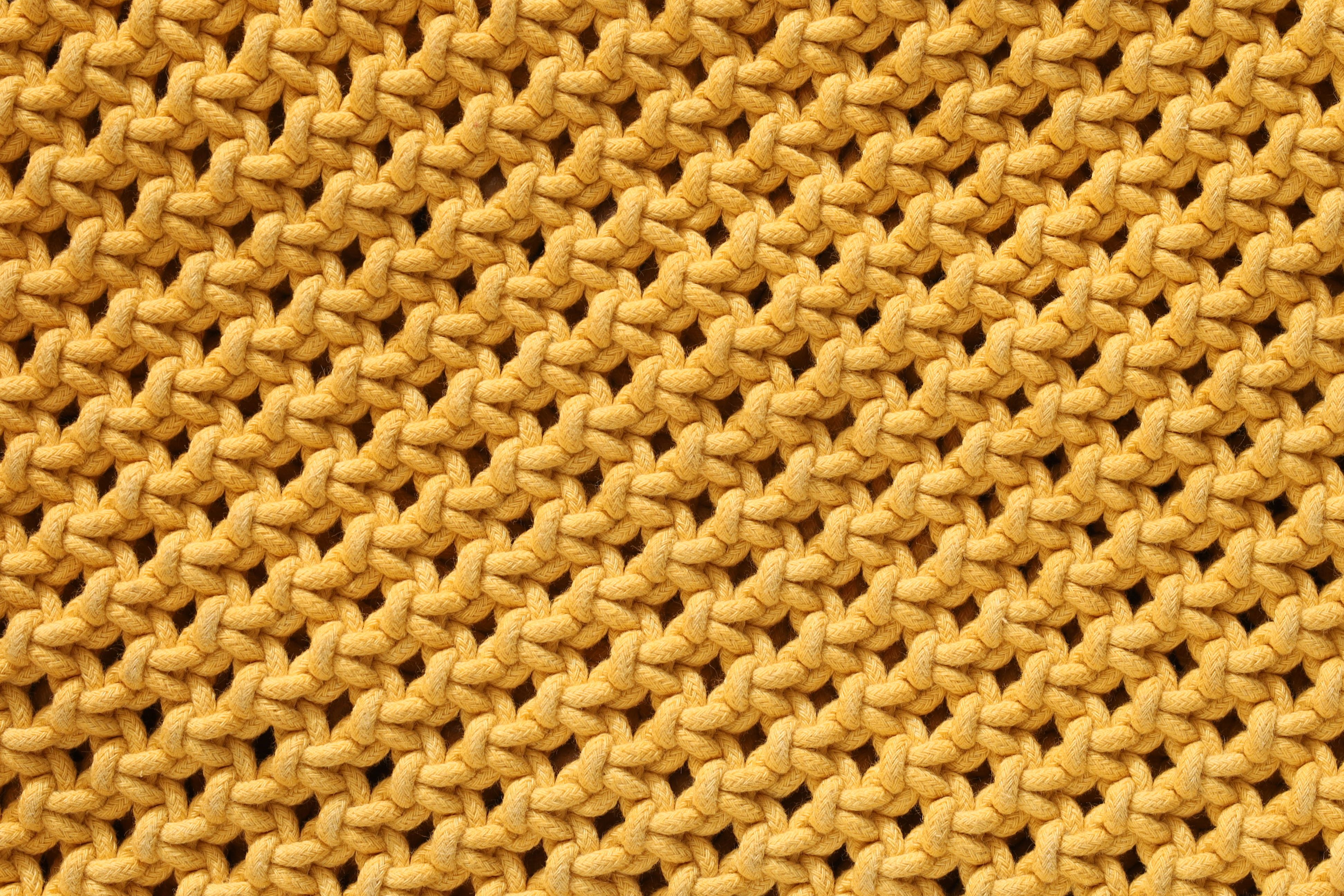 Close-Up of Yellow Knitted Fabric Pattern · Free Stock Photo