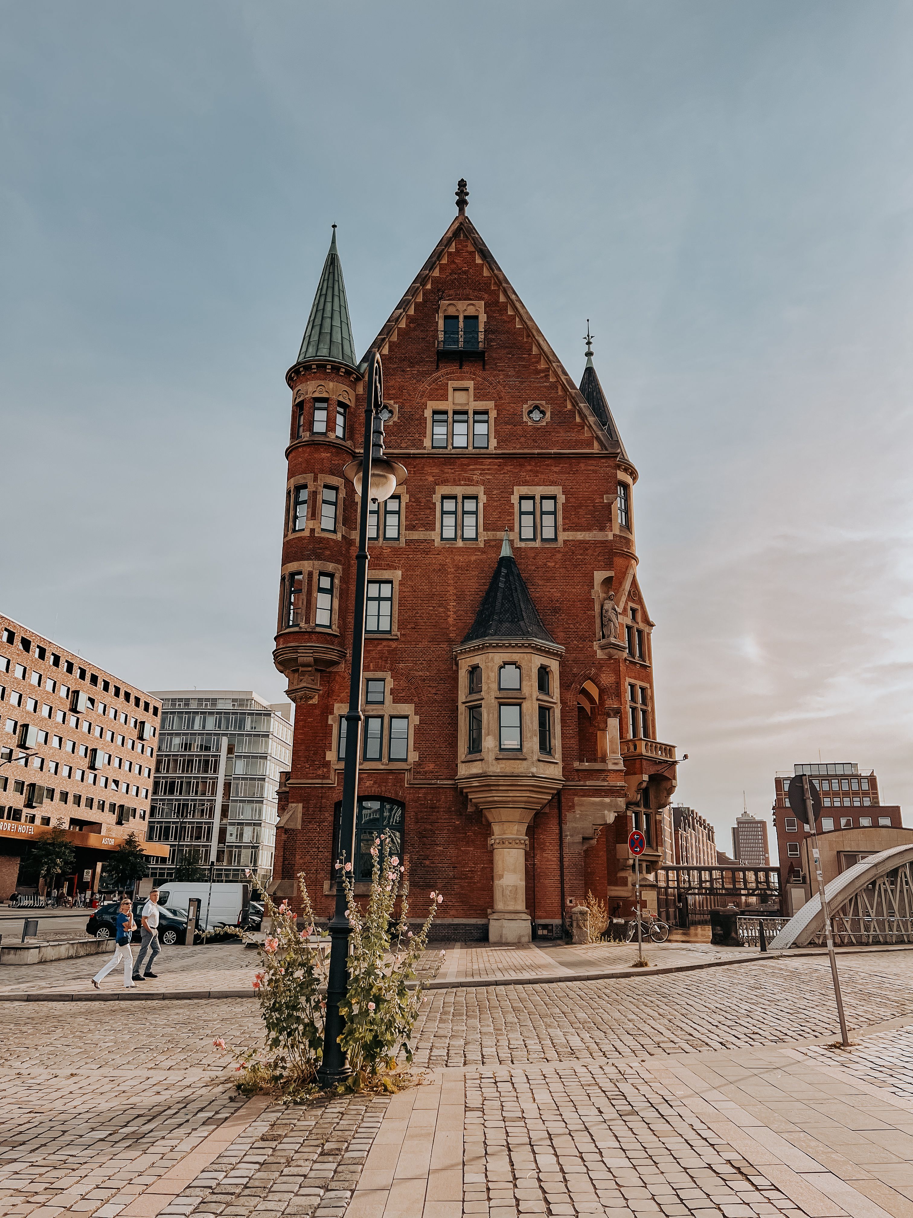 Historic Red Brick Building in Urban Setting · Free Stock Photo