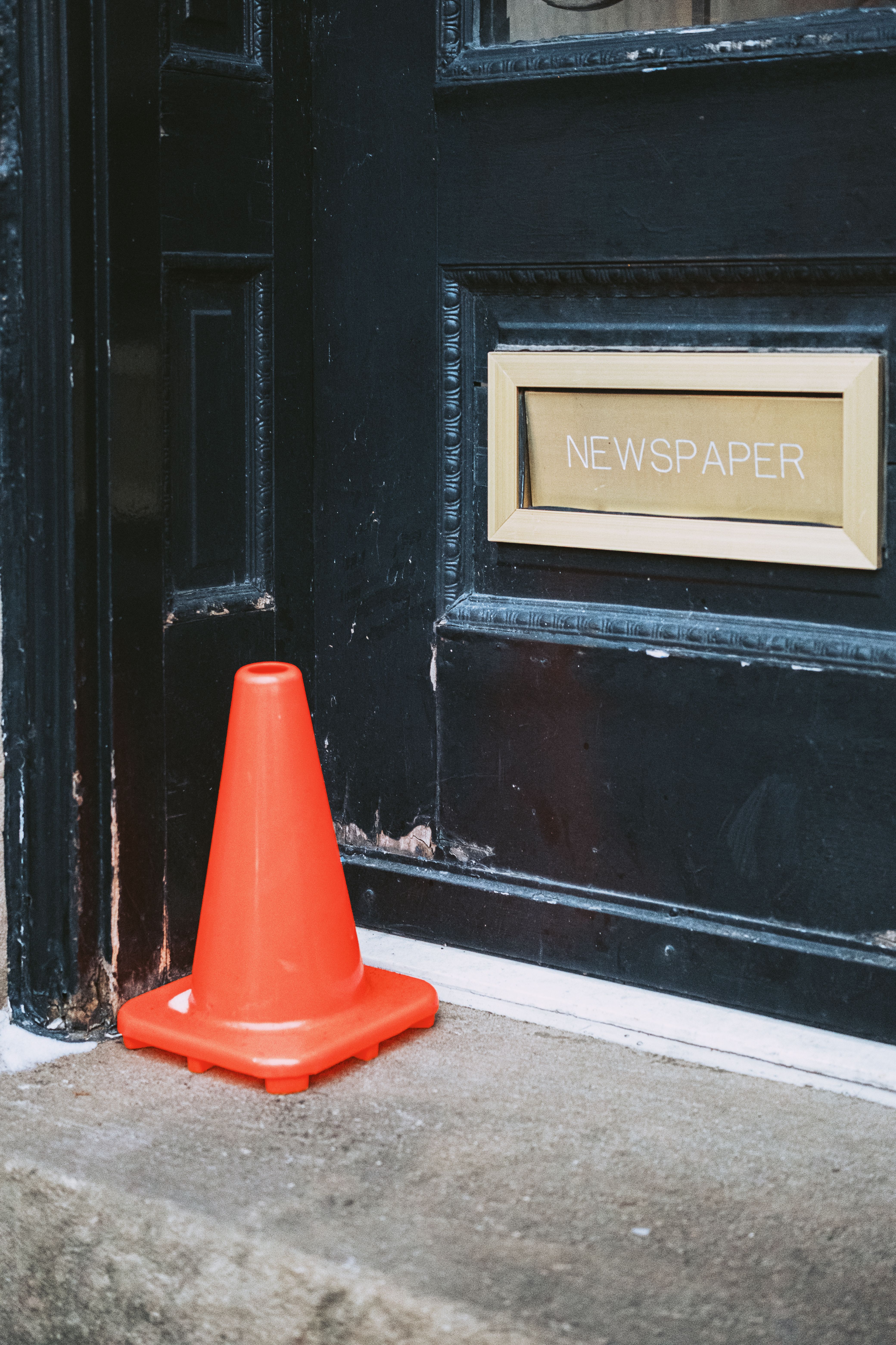 Orange Traffic Cone by Newspaper Slot · Free Stock Photo