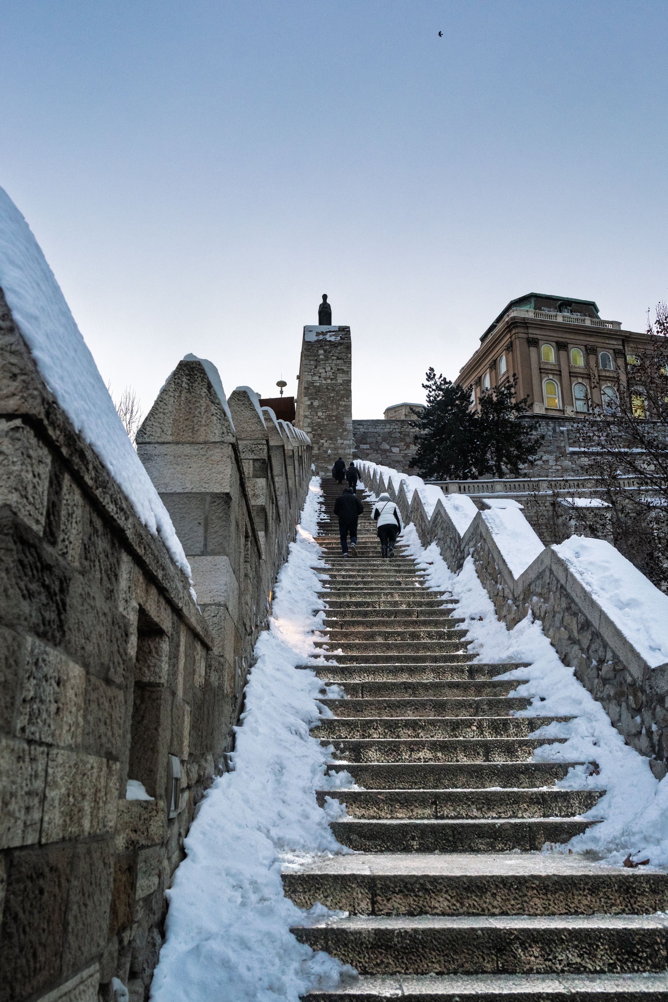 Snowy Steps Leading to a Statue in Budapest · Free Stock Photo