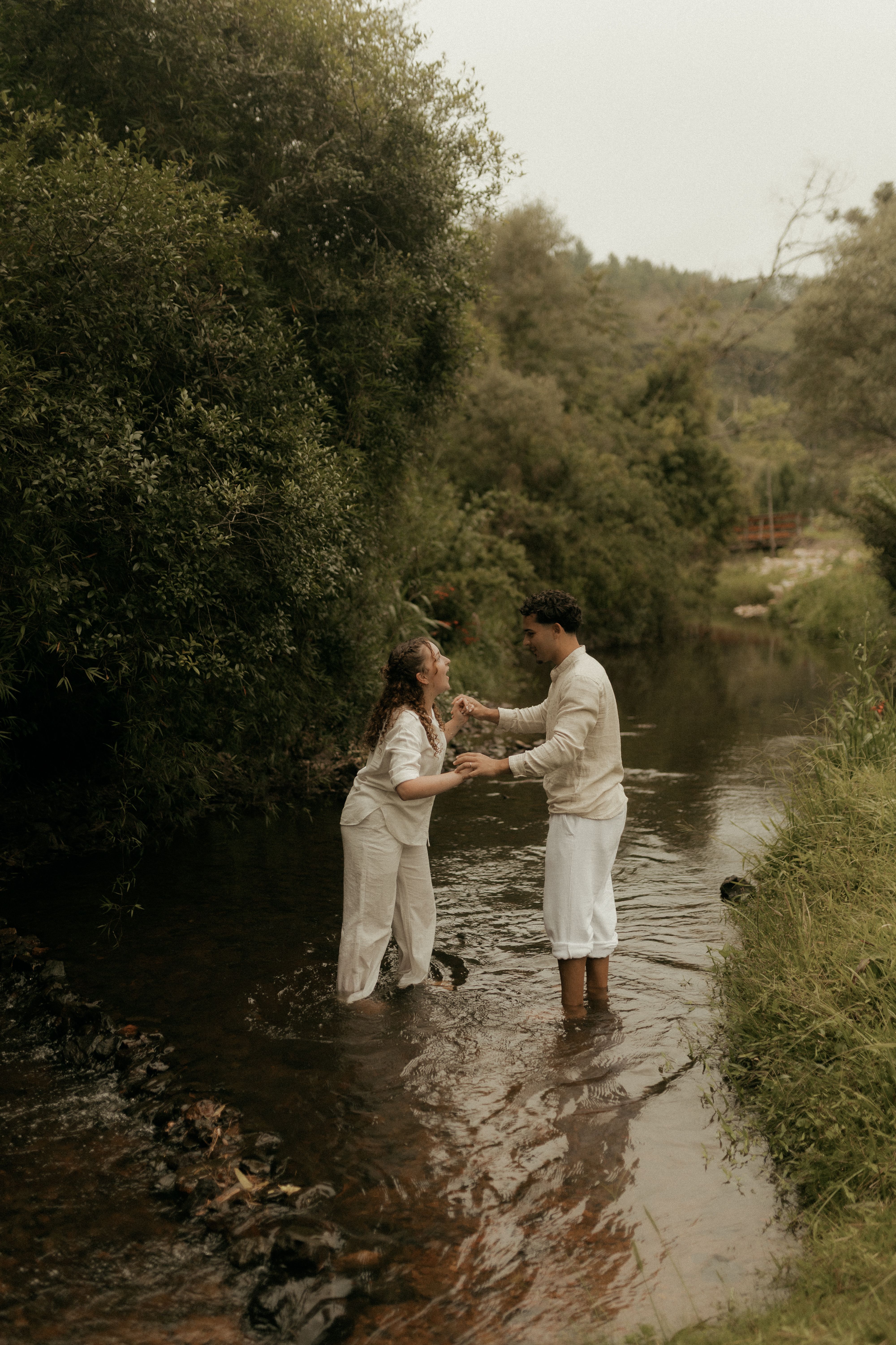Romantic Couple Enjoys a Day in Nature Stream · Free Stock Photo