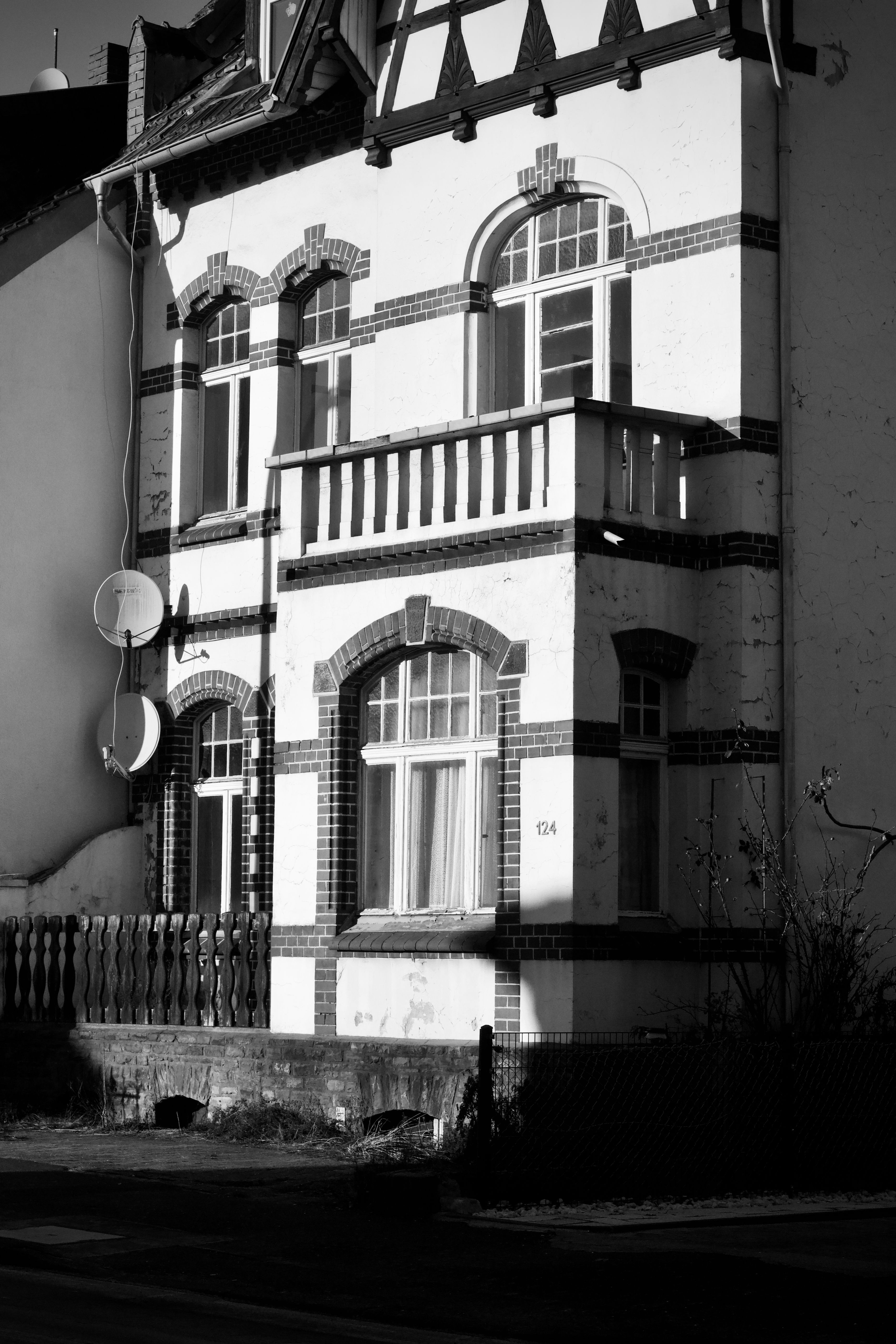 Historic European Brick Building in Monochrome · Free Stock Photo