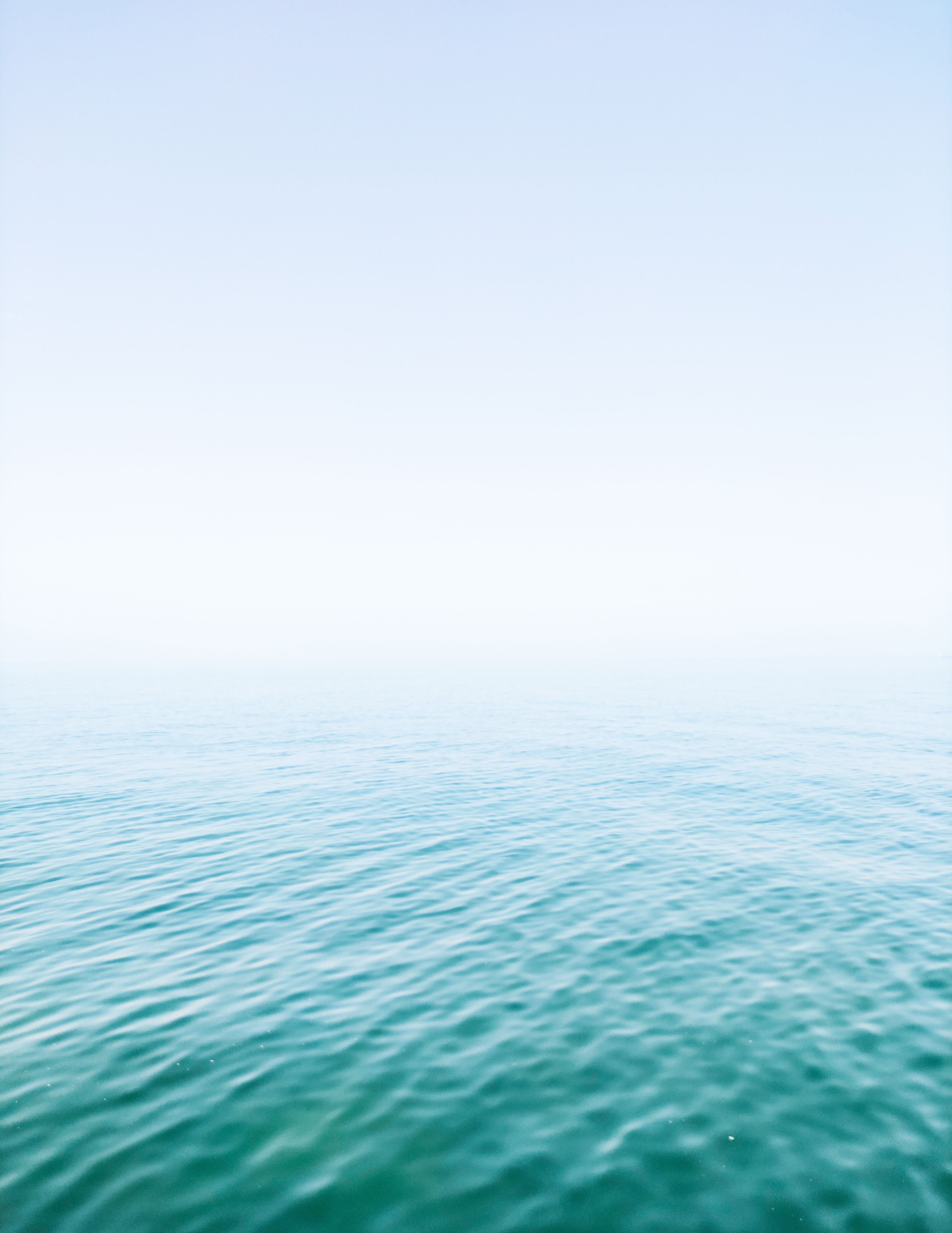 Clear Sky over Body of Water · Free Stock Photo