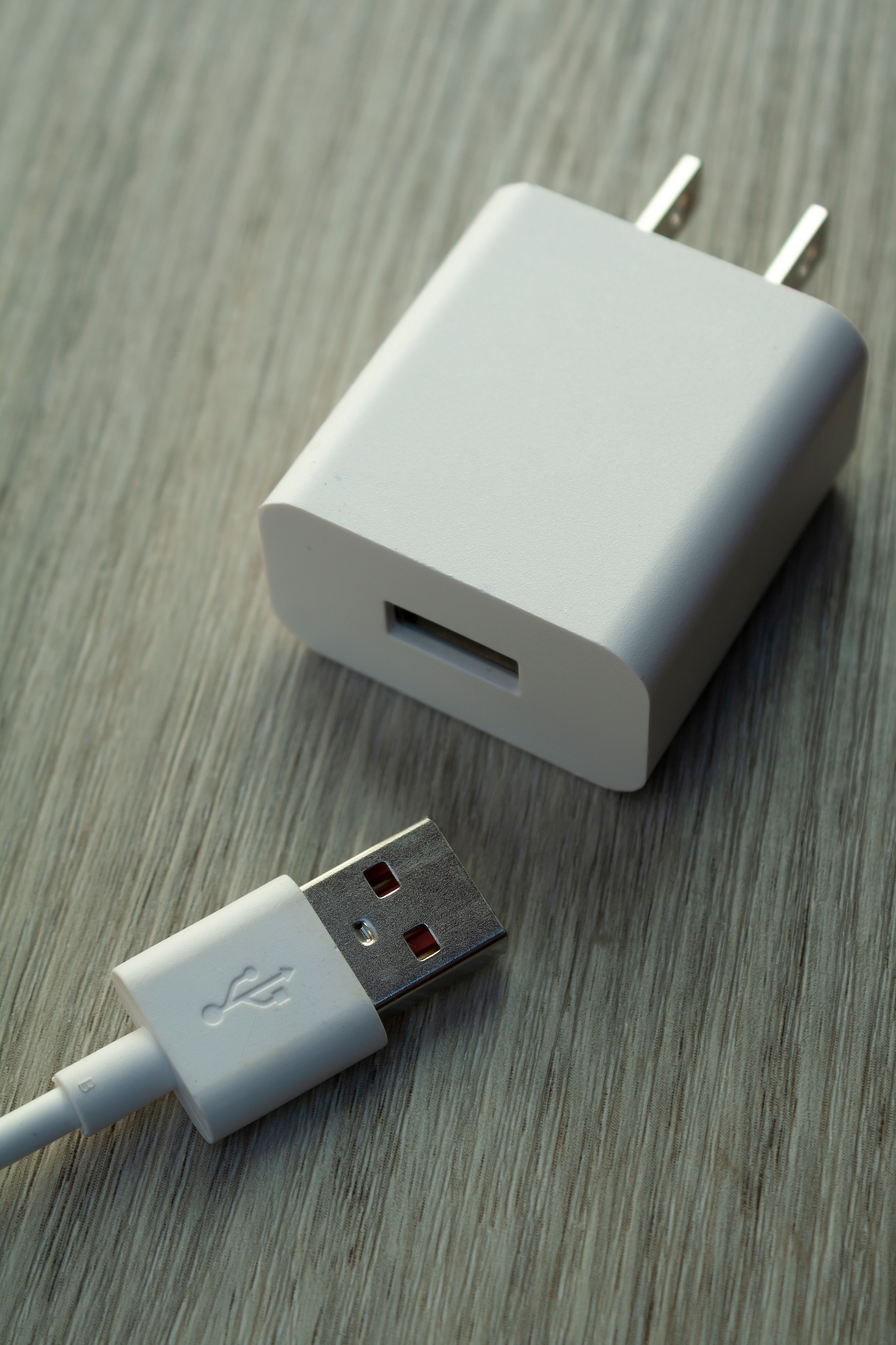 Close-up of White USB Charger and Cable · Free Stock Photo