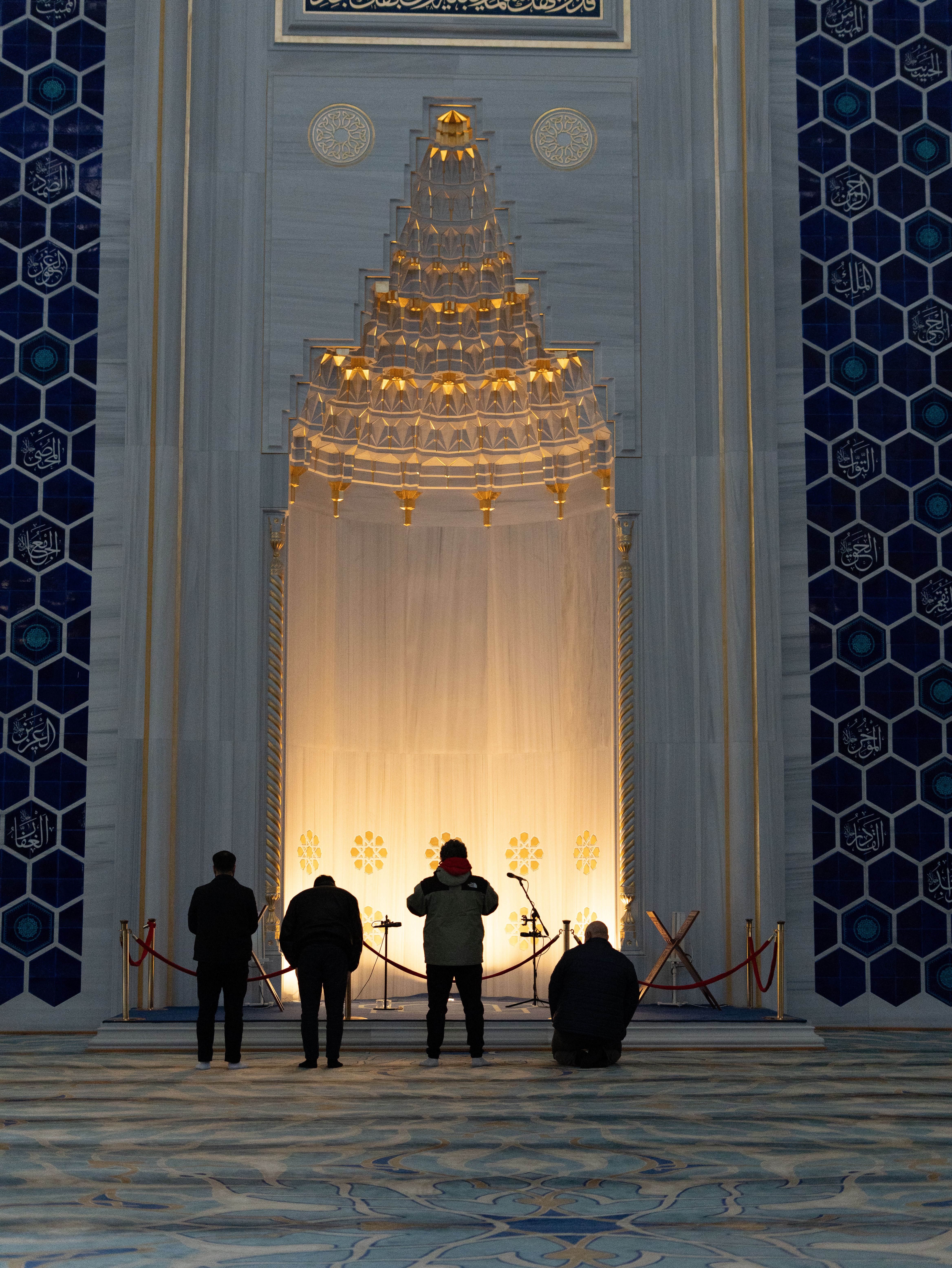 Inside an Ornate Mosque with Visitors · Free Stock Photo