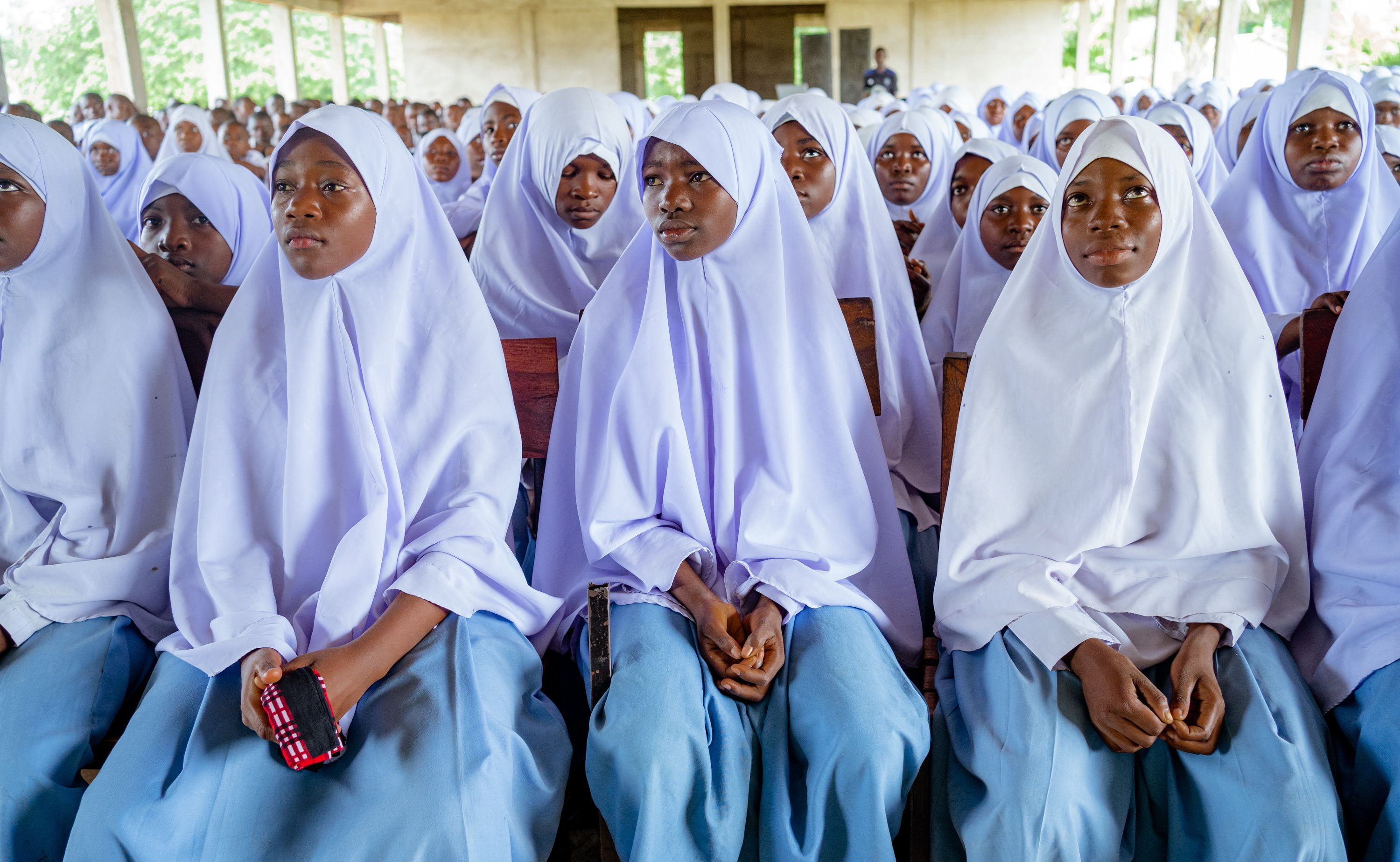 Students in Traditional Attire During School Assembly · Free Stock Photo