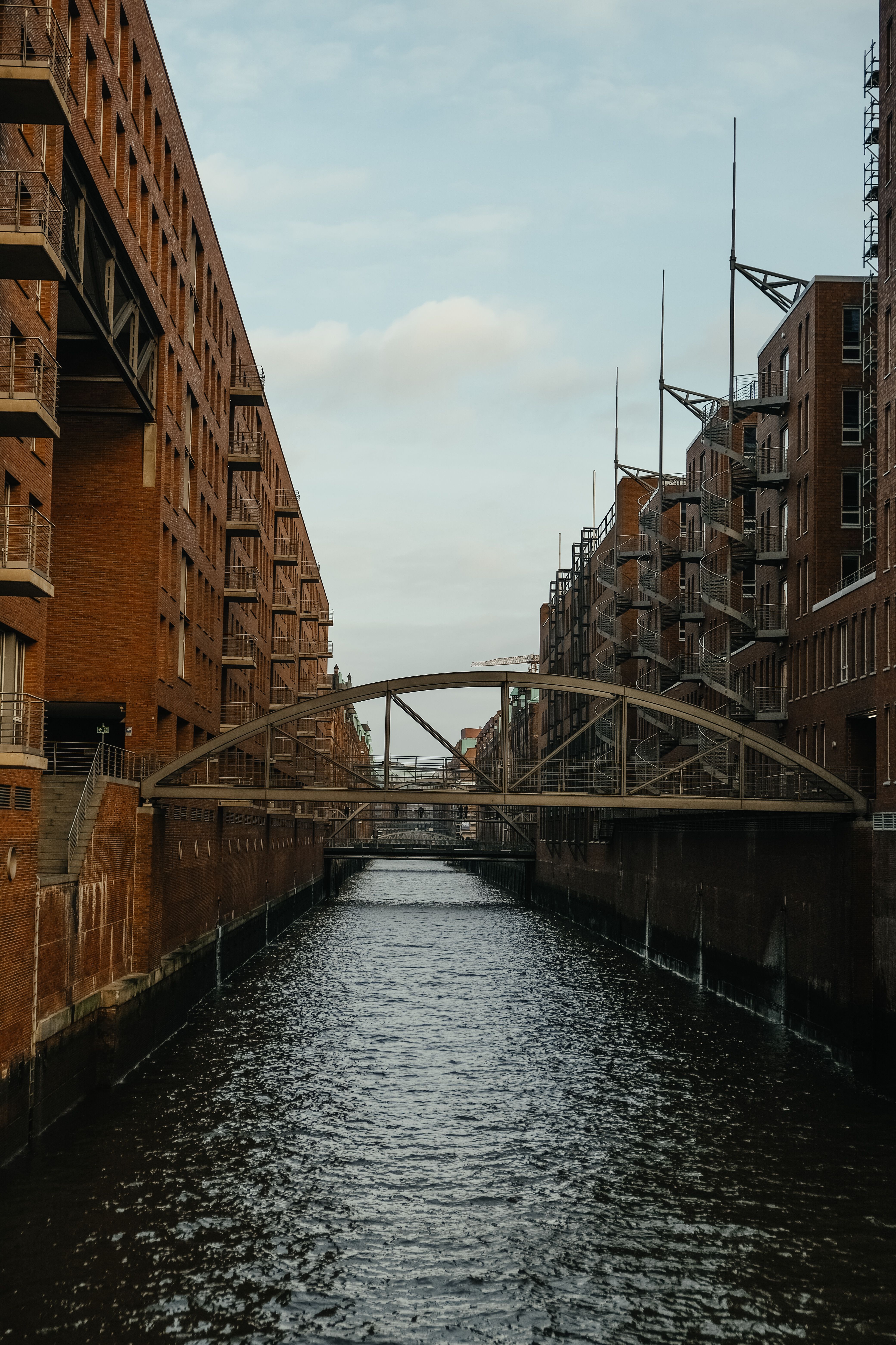 Industrial Canal with Metal Bridge in Hamburg · Free Stock Photo