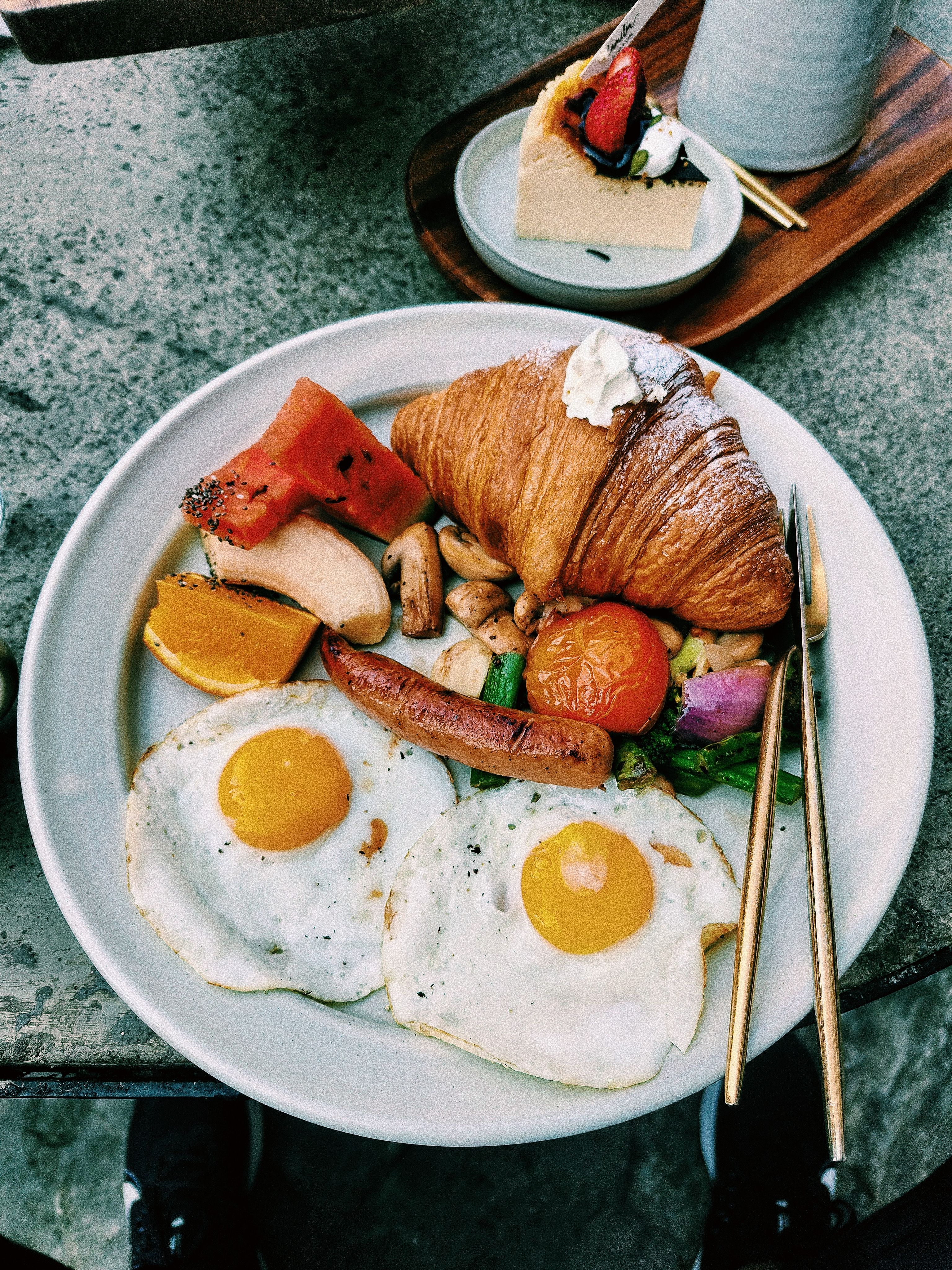 Delicious Breakfast Plate with Eggs and Croissant · Free Stock Photo
