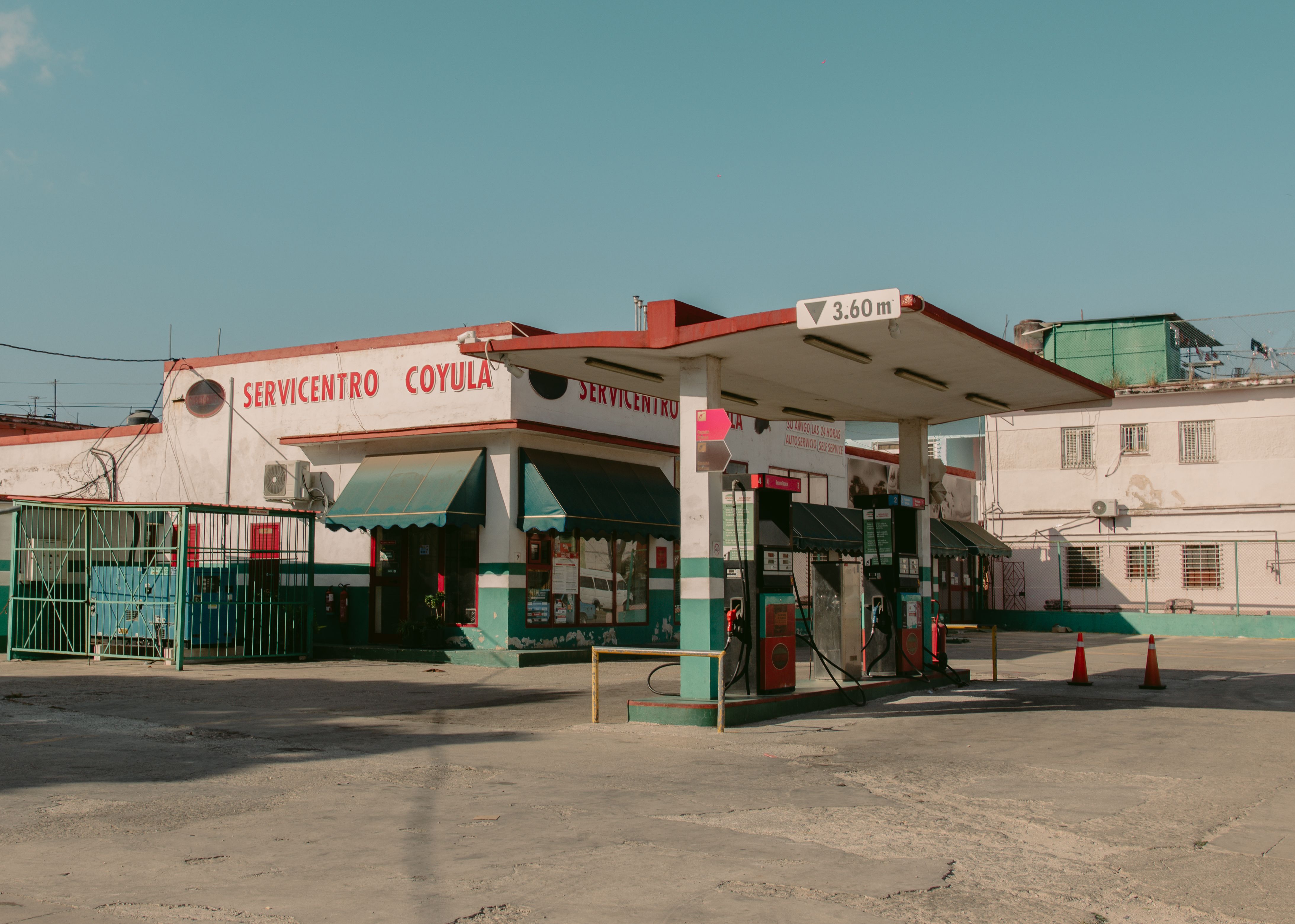 Rustic Gas Station in Bright Daylight · Free Stock Photo