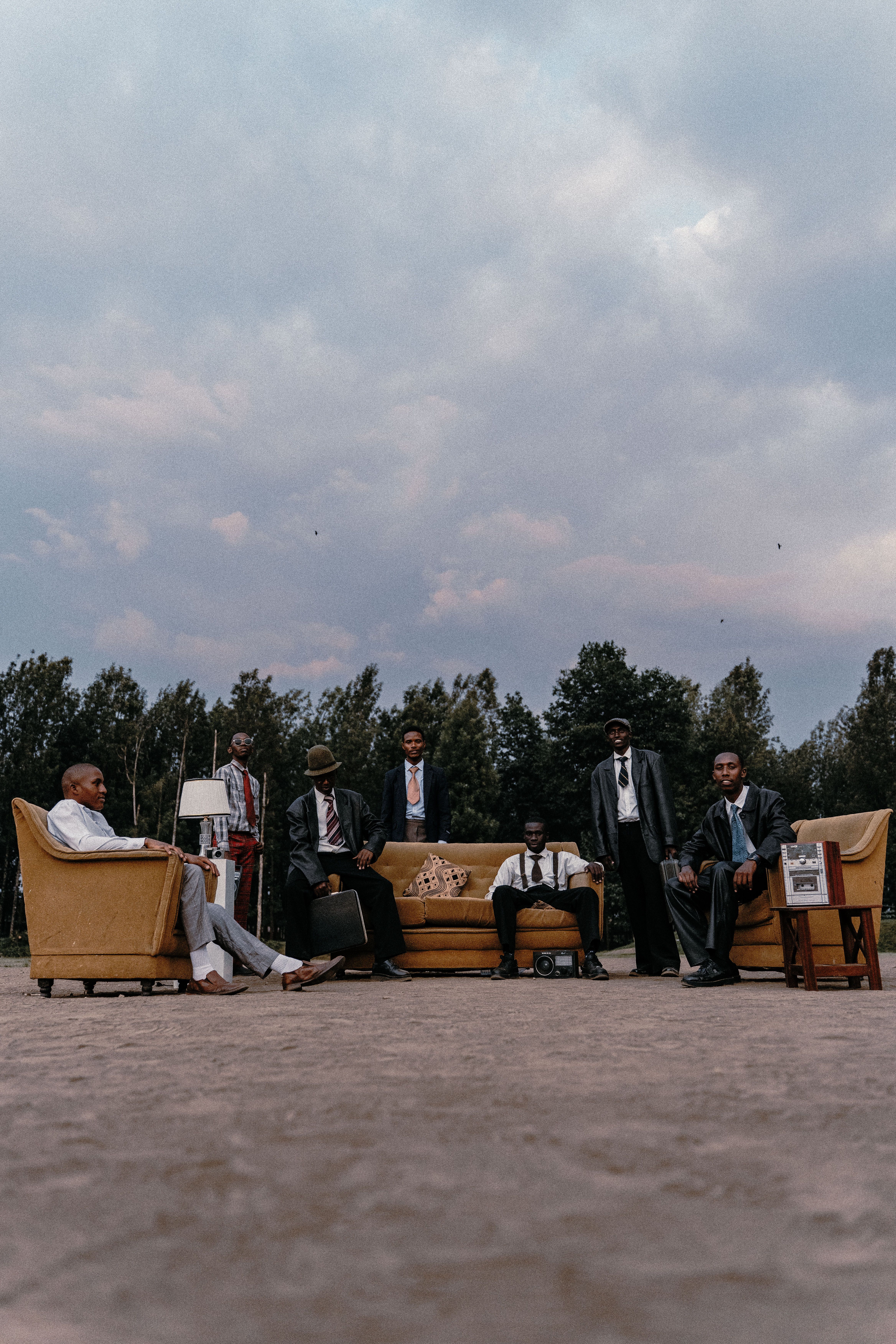 Stylish Group of Men in Outdoor Setting · Free Stock Photo