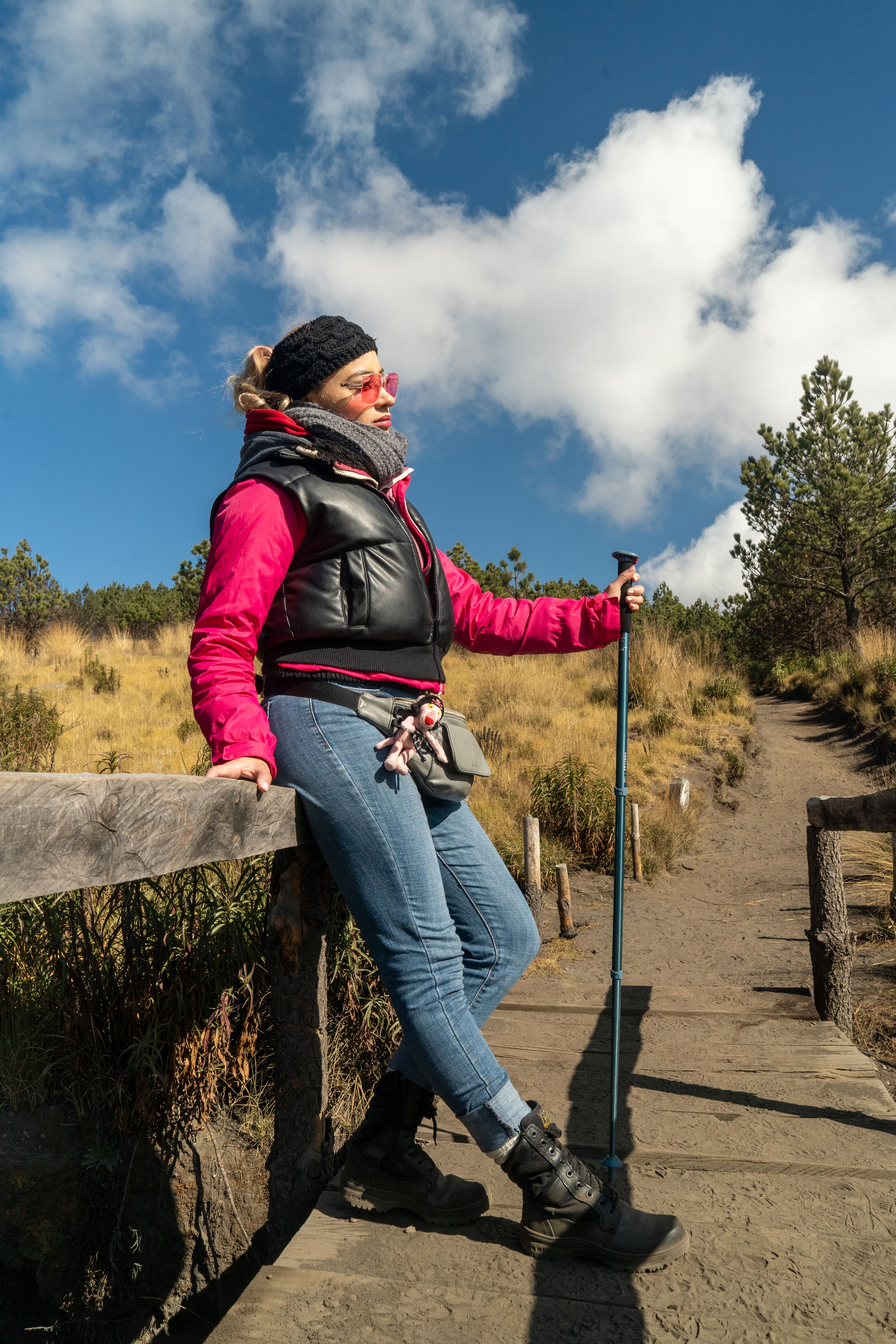 Woman Enjoying Hiking in Scenic Mountain Path · Free Stock Photo