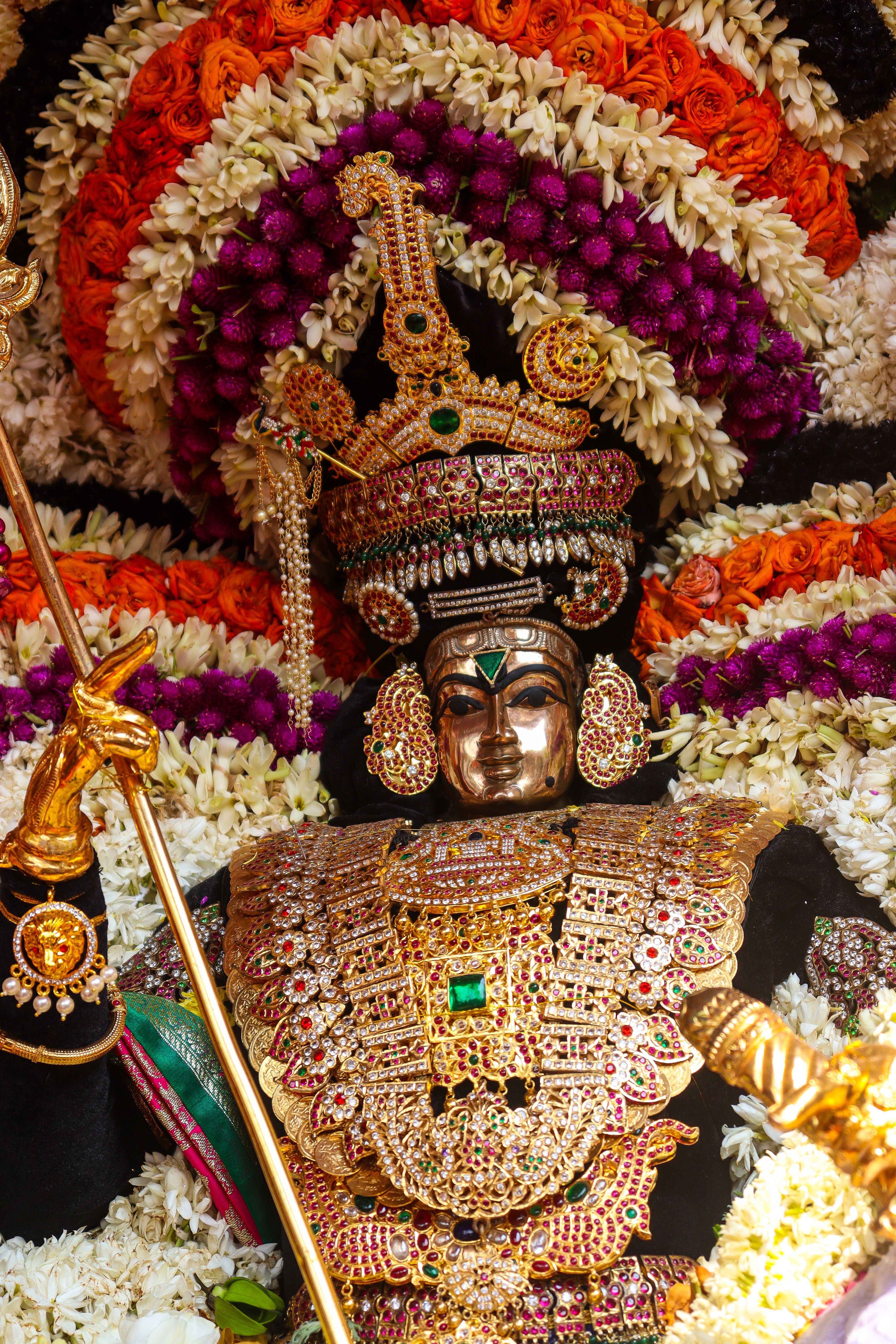 Vibrant Hindu Festival Statue Decorated with Flowers · Free Stock Photo