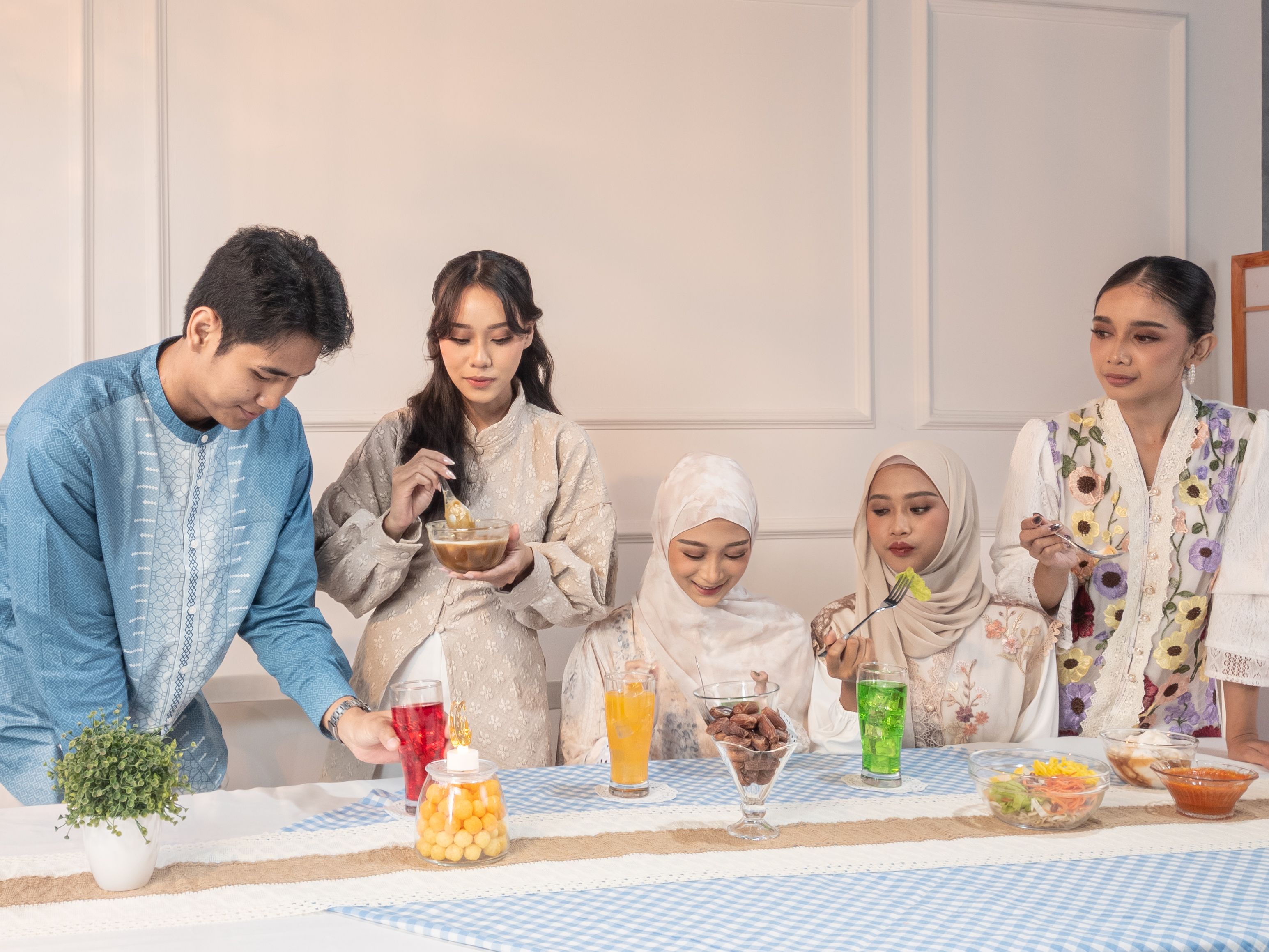 Group of Friends Enjoying a Feast in Jakarta · Free Stock Photo