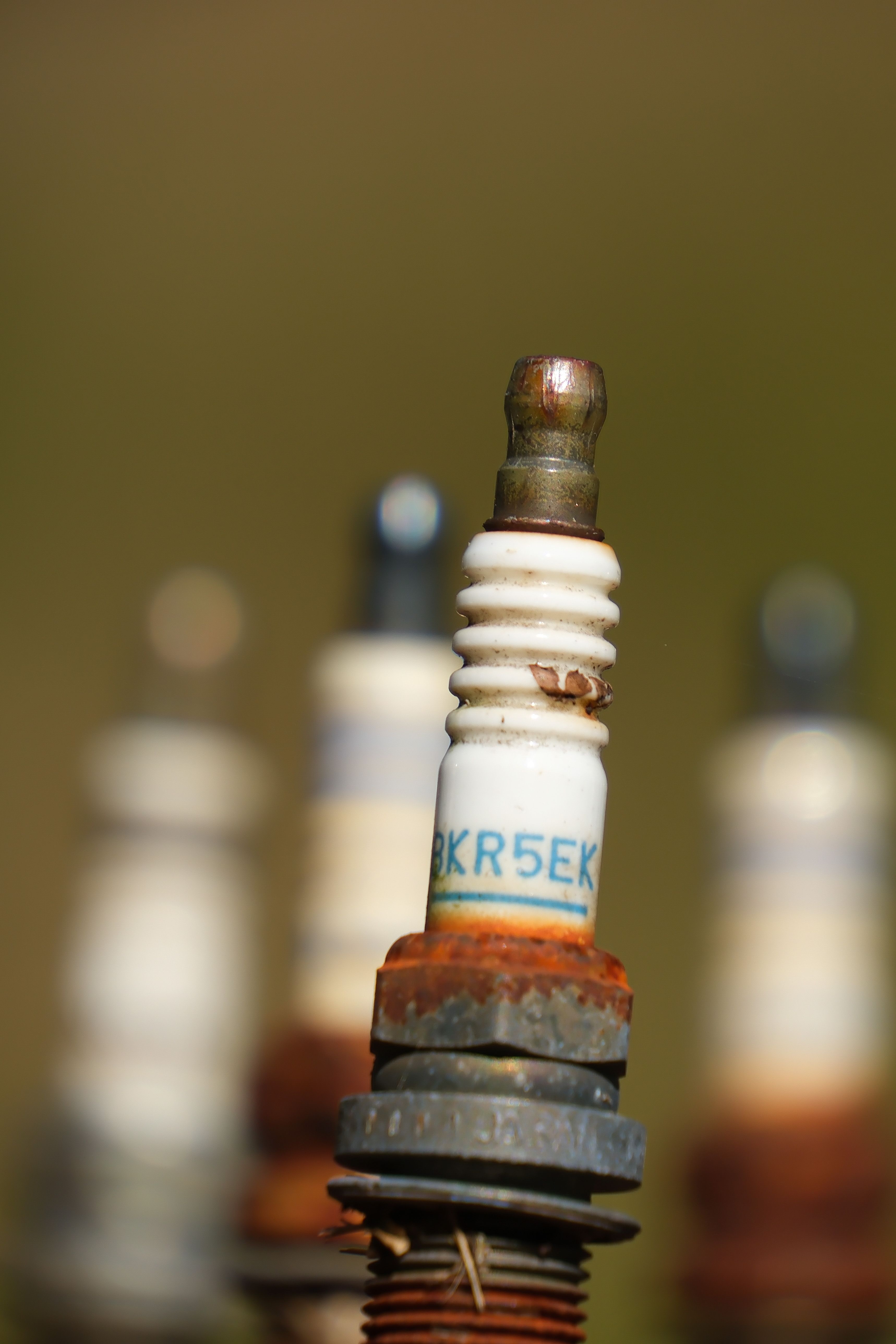Close-up of Old Rusty Spark Plugs · Free Stock Photo