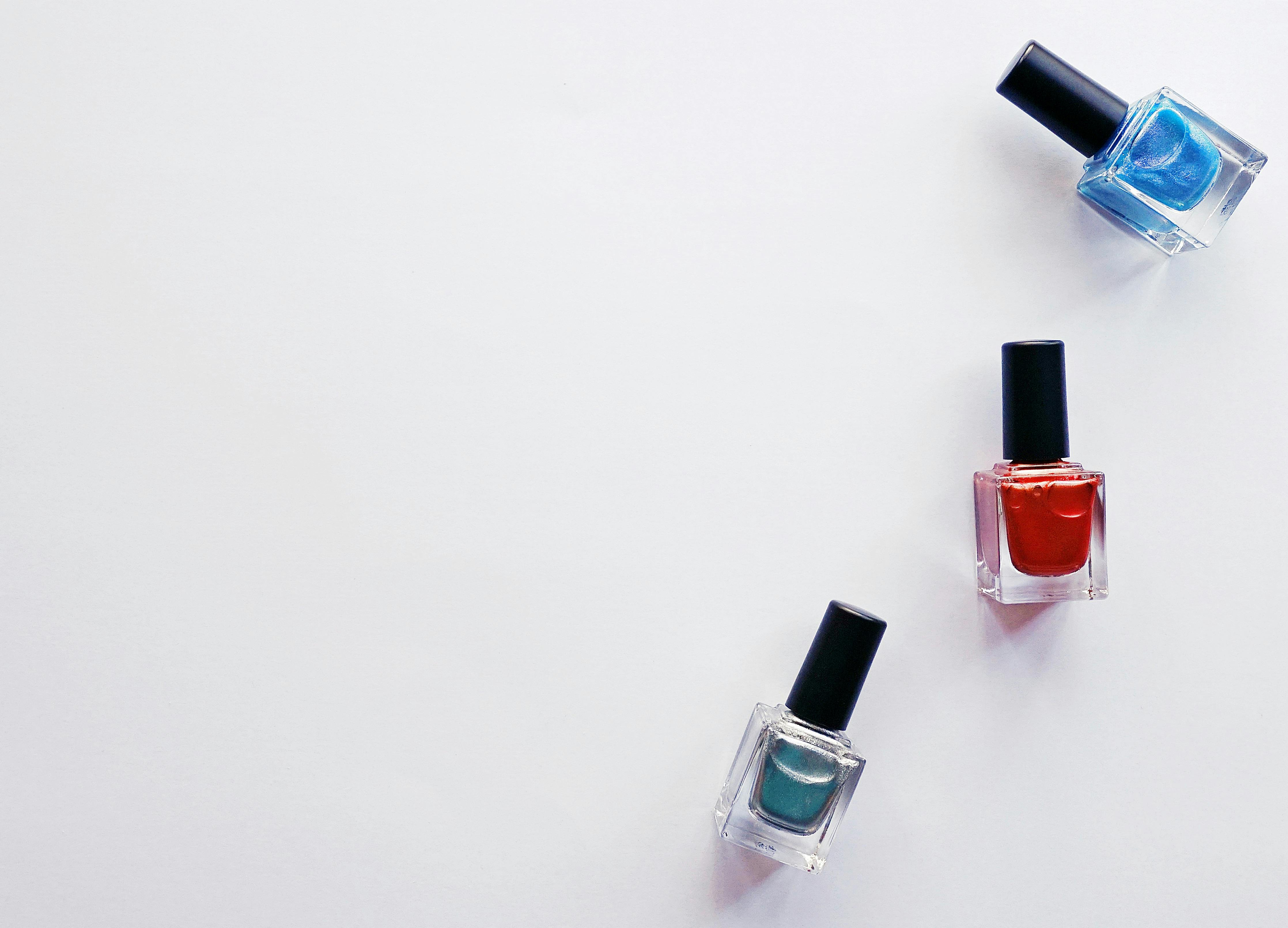 Nail Polish on White Background · Free Stock Photo