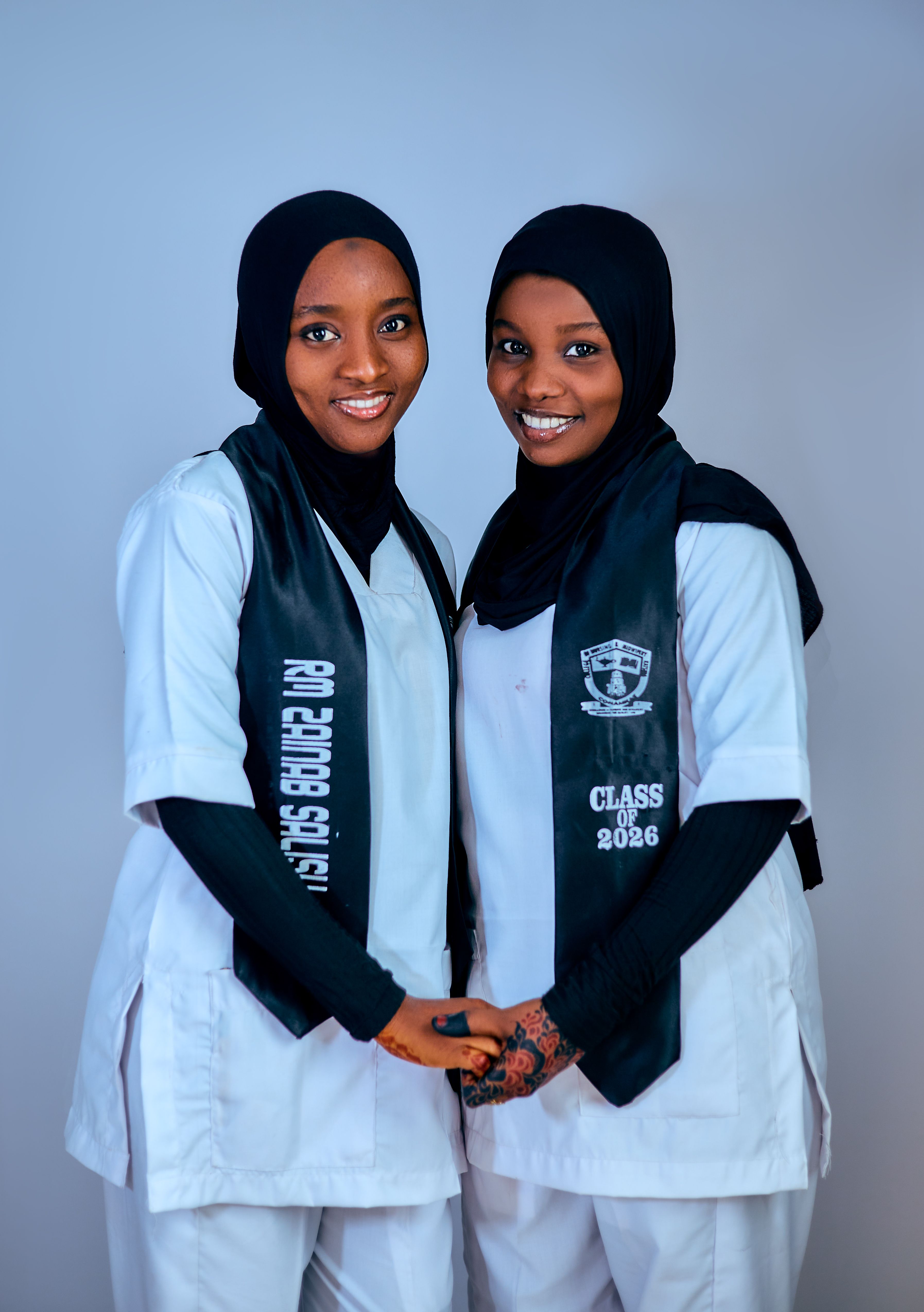 Graduates in Nursing Uniforms Celebrating · Free Stock Photo