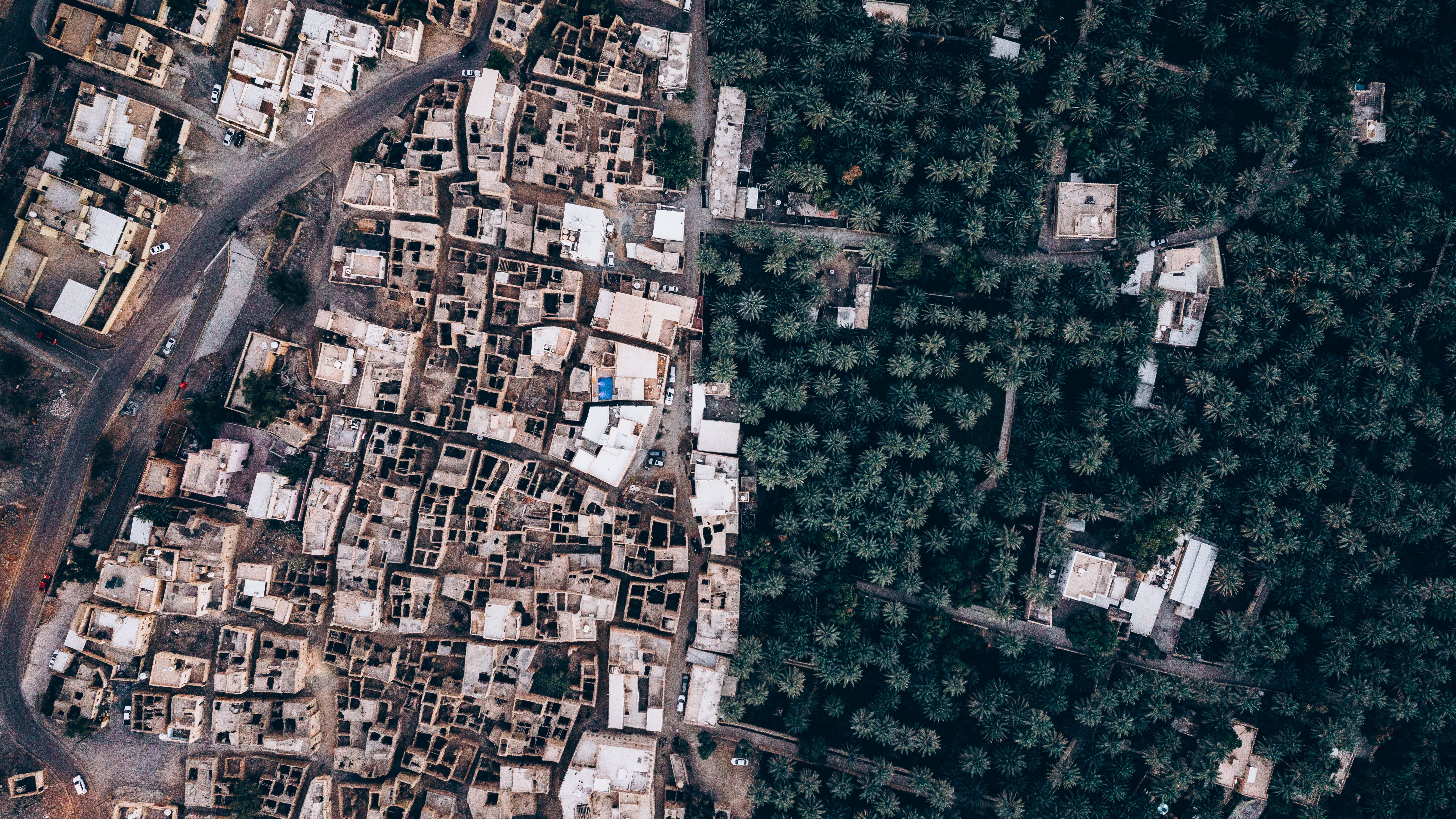 Aerial View of Mud Houses and Palm Oasis in Oman · Free Stock Photo