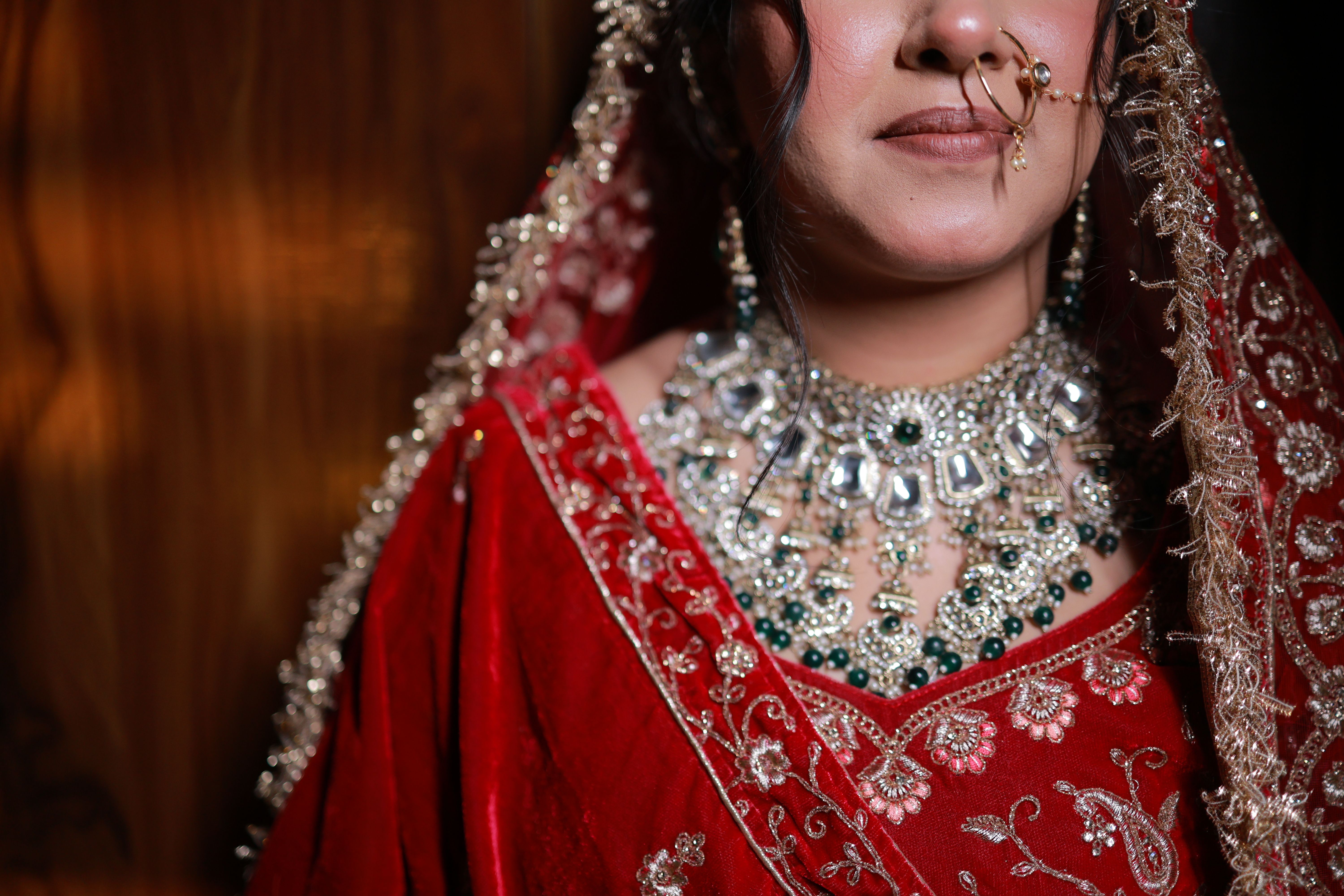 Elegant Indian Bride in Traditional Red Saree · Free Stock Photo