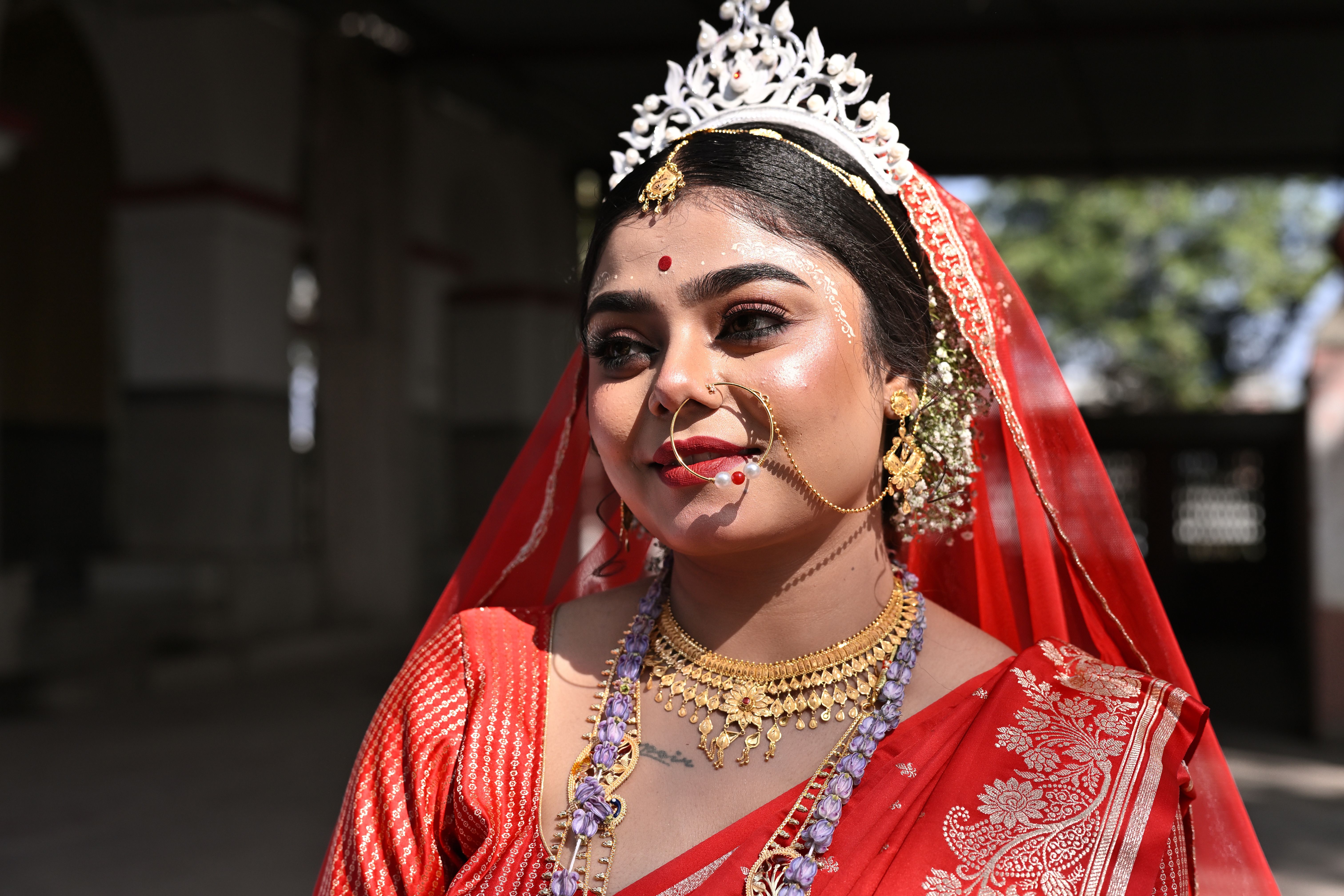 Traditional Bengali Bride in Red Saree with Gold Jewelry · Free Stock Photo
