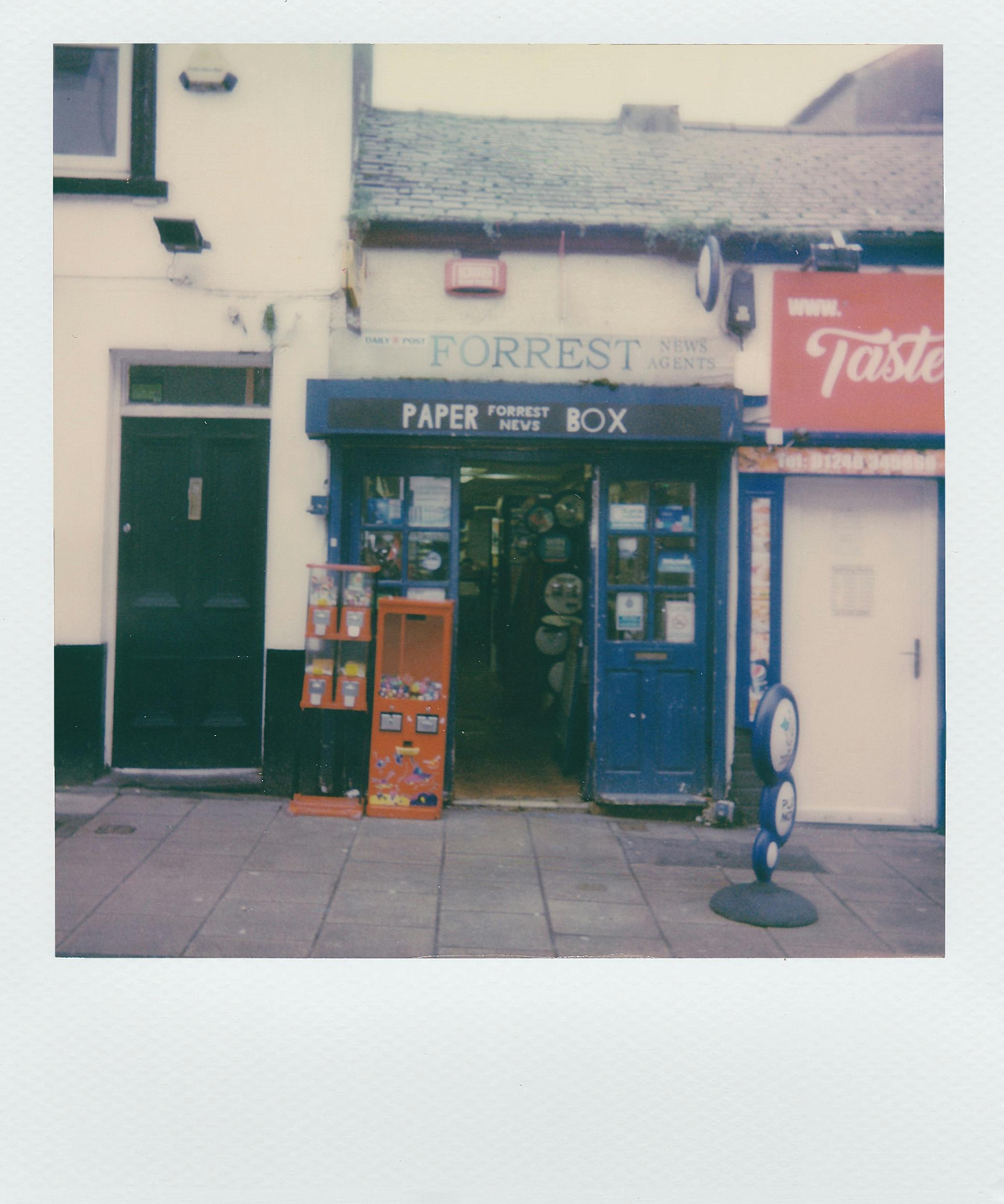 Blue and White Store Front · Free Stock Photo