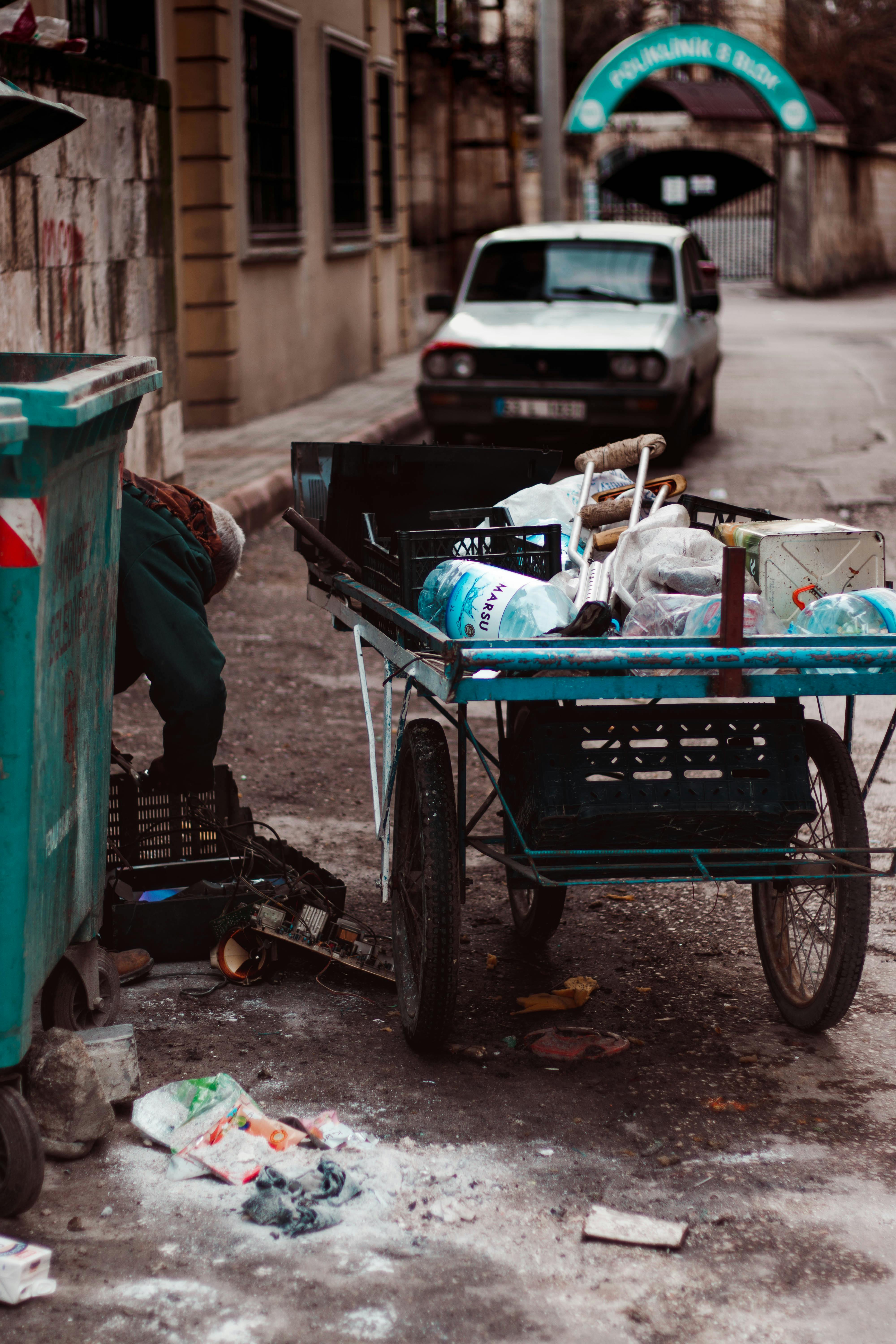 Person Collecting Garbage · Free Stock Photo