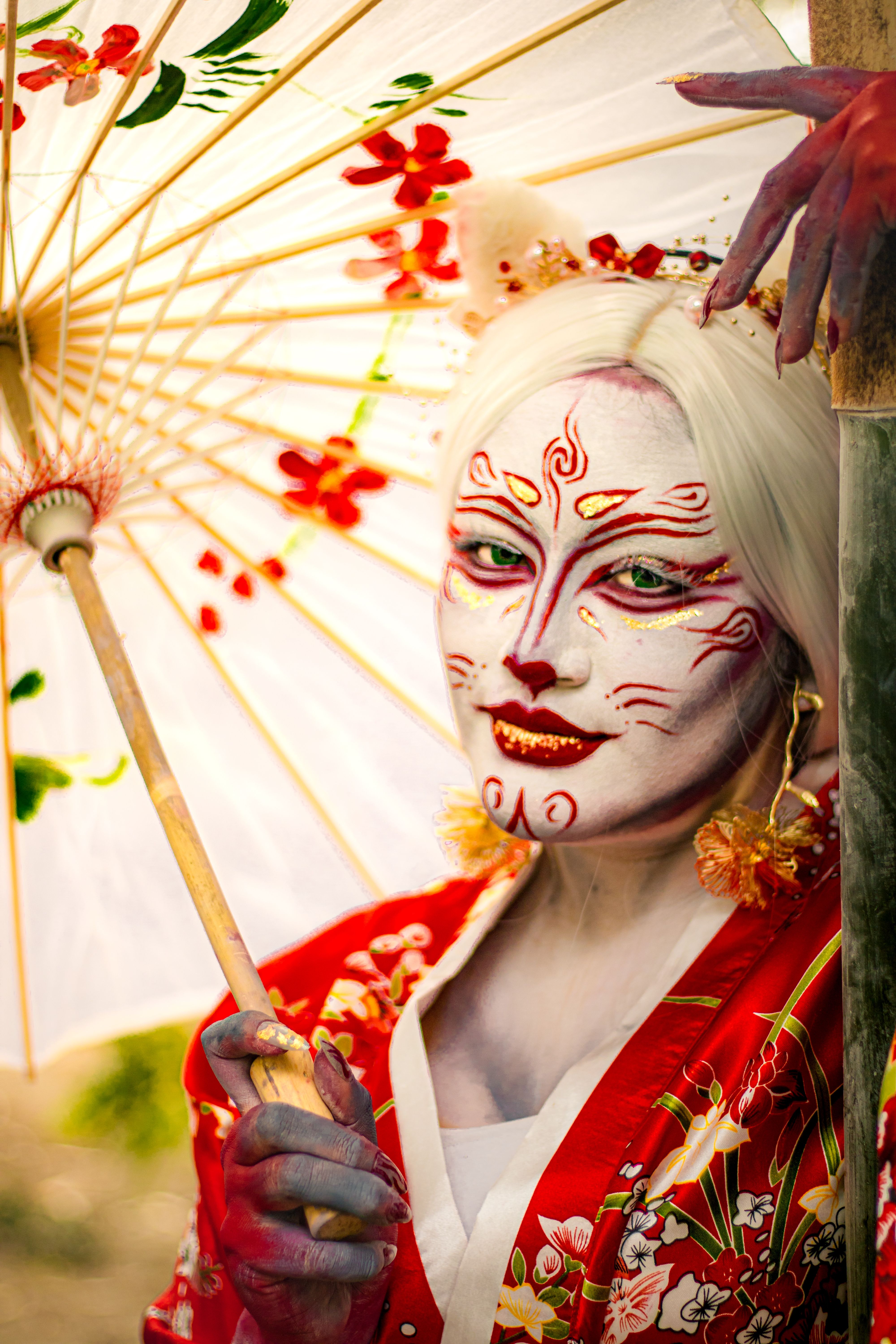 Geisha-Inspired Portrait with Artistic Makeup · Free Stock Photo