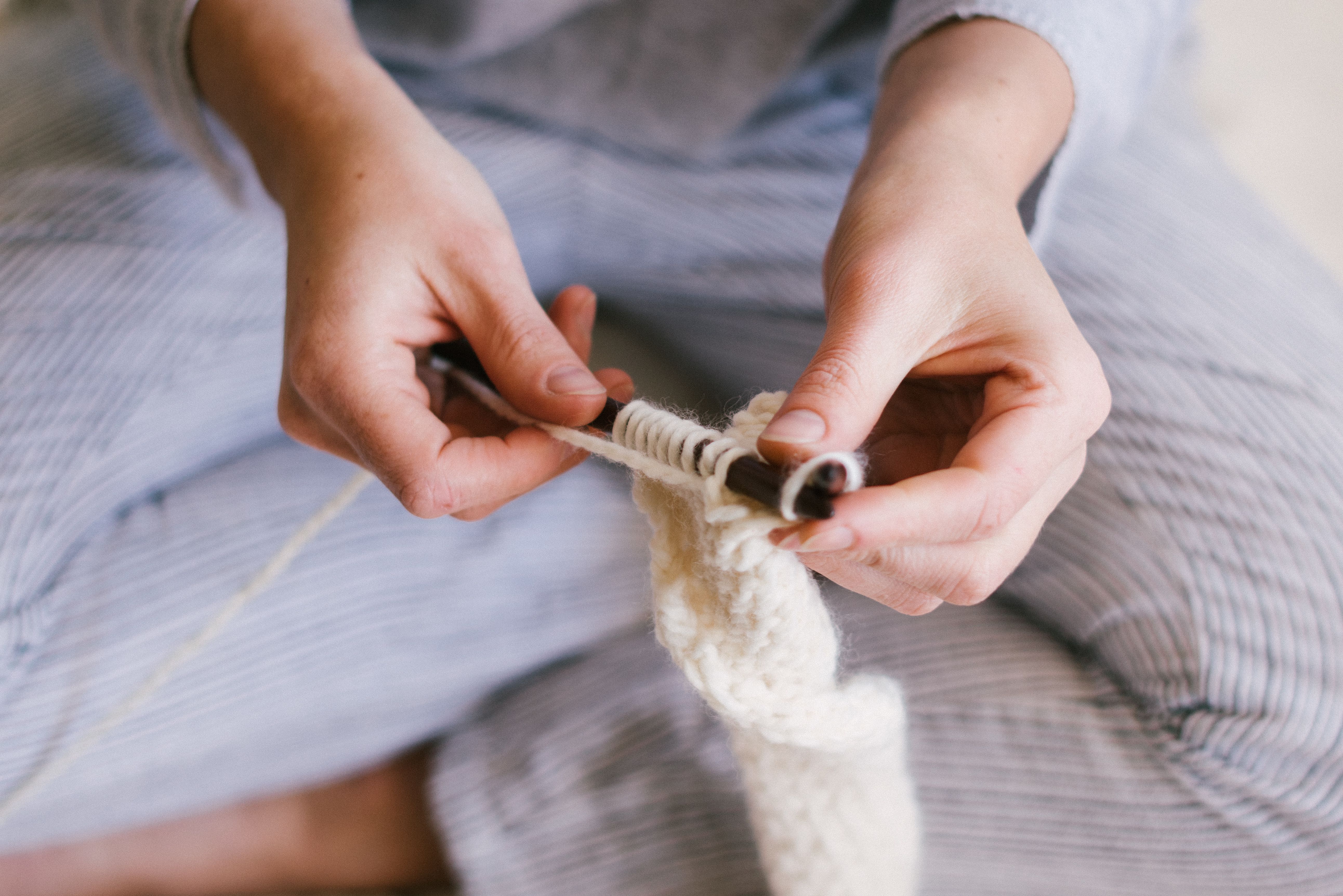 Person Holding A Crochet Hook · Free Stock Photo
